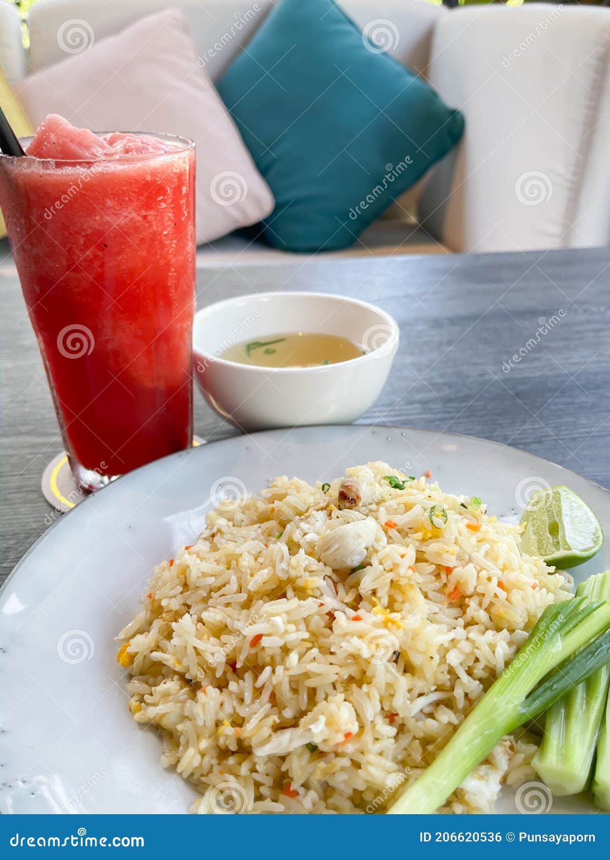 Fried rice on white plate stock photo. Image of meal - 206620536