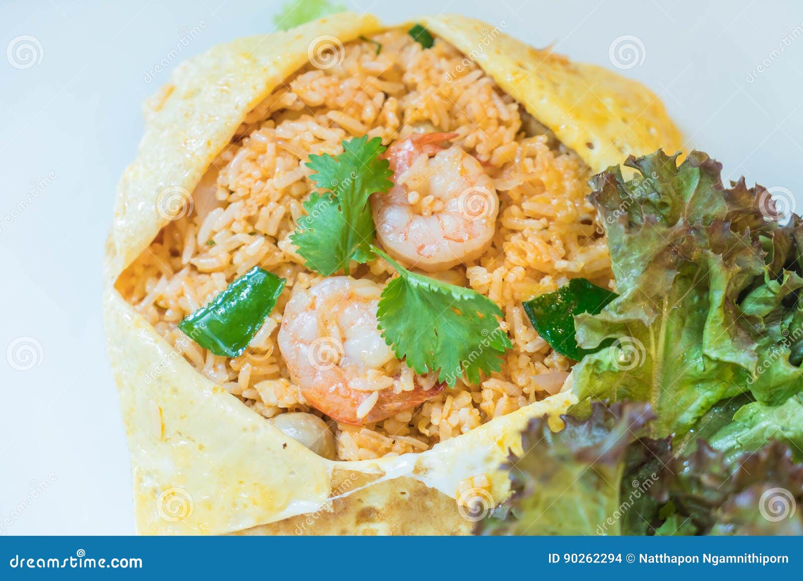 Fried rice wrapped in egg stock photo. Image of prawn - 90262294