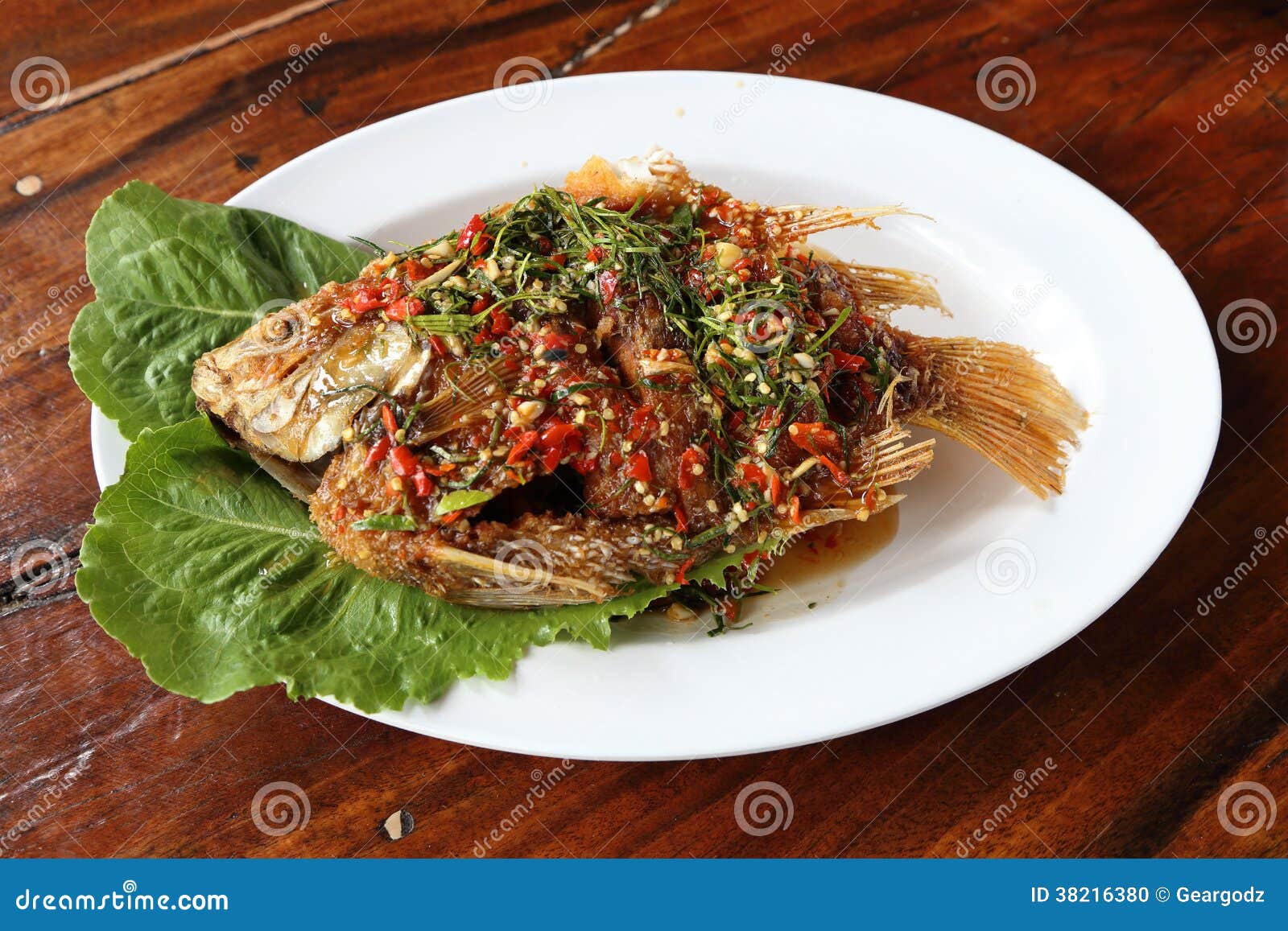 Fried Ruby Fish Topped with Sweet,sauer and Hot Sauce Stock Photo ...