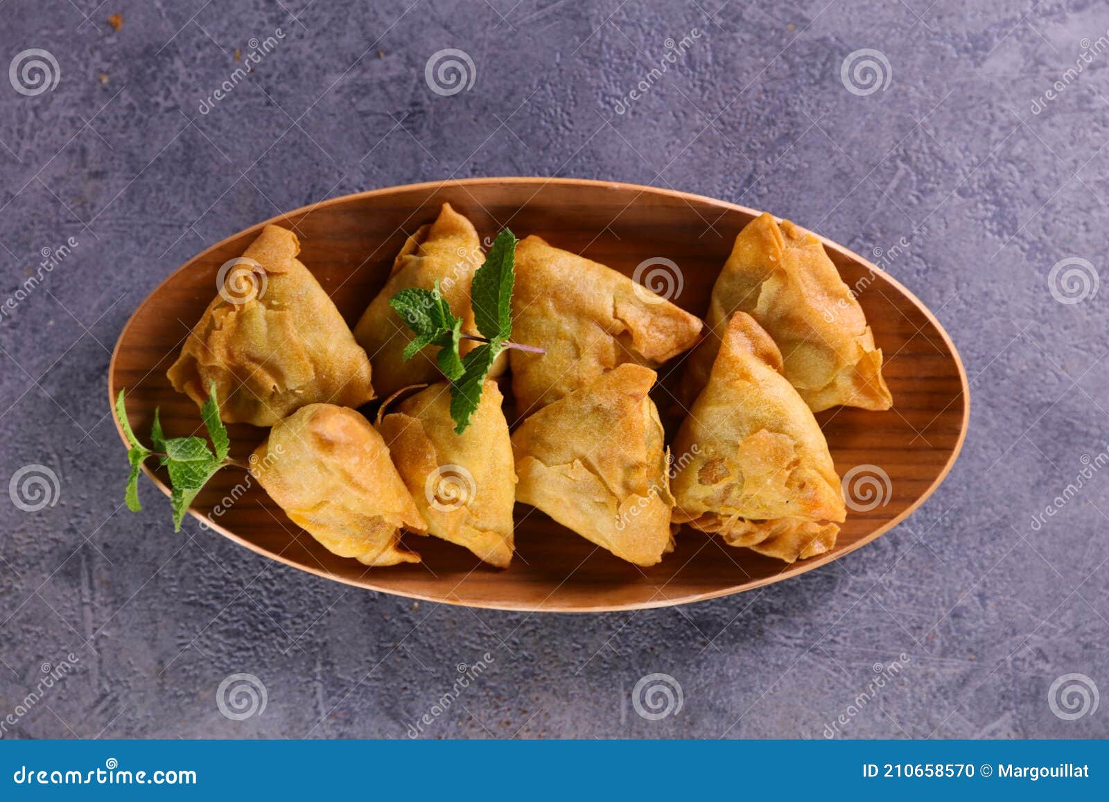 Fried samosa and mint stock photo. Image of fried, filling - 210658570