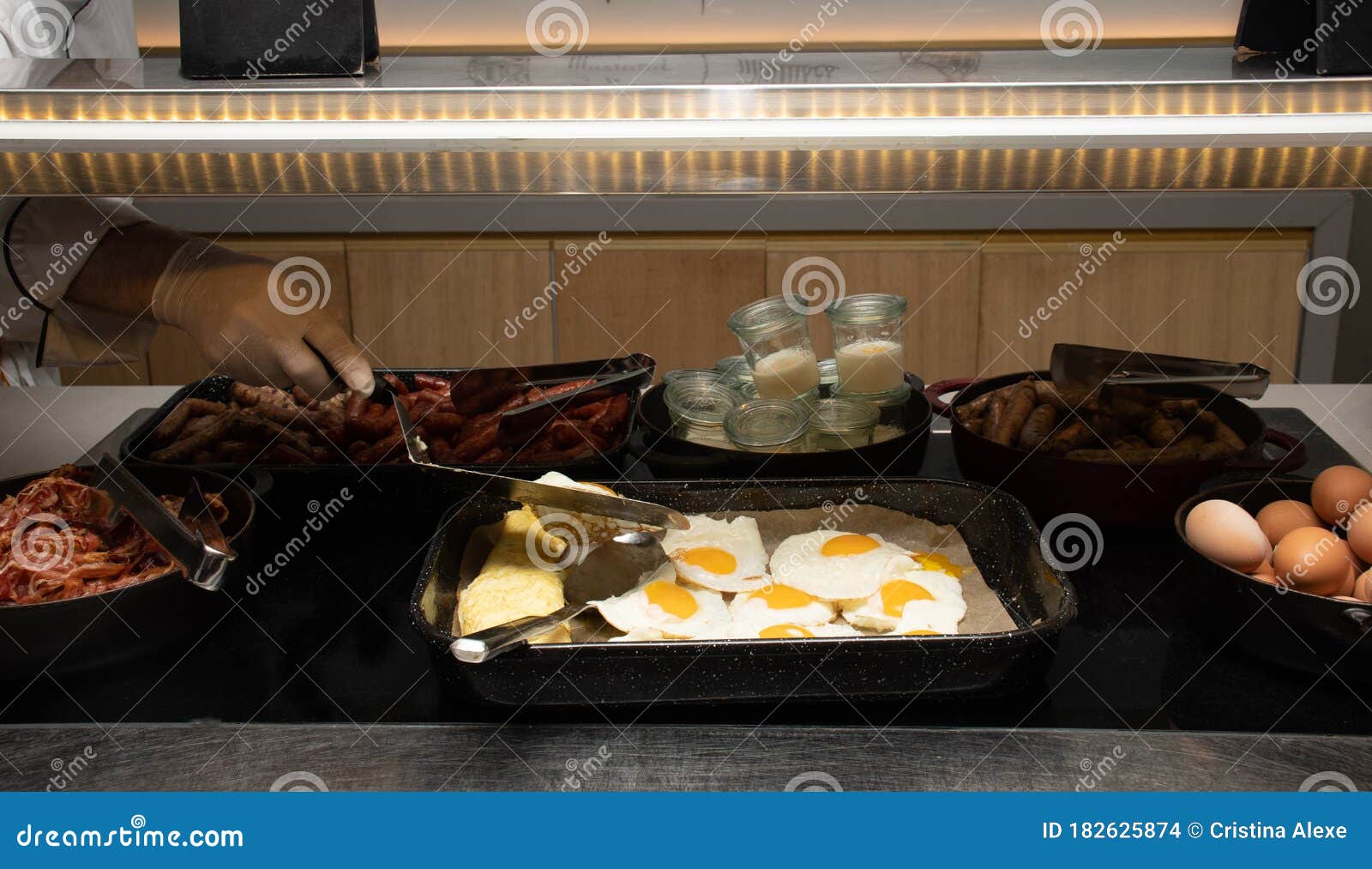 Fried and Scrambled Eggs and Omelette Station in a Hotel or Restaurant ...