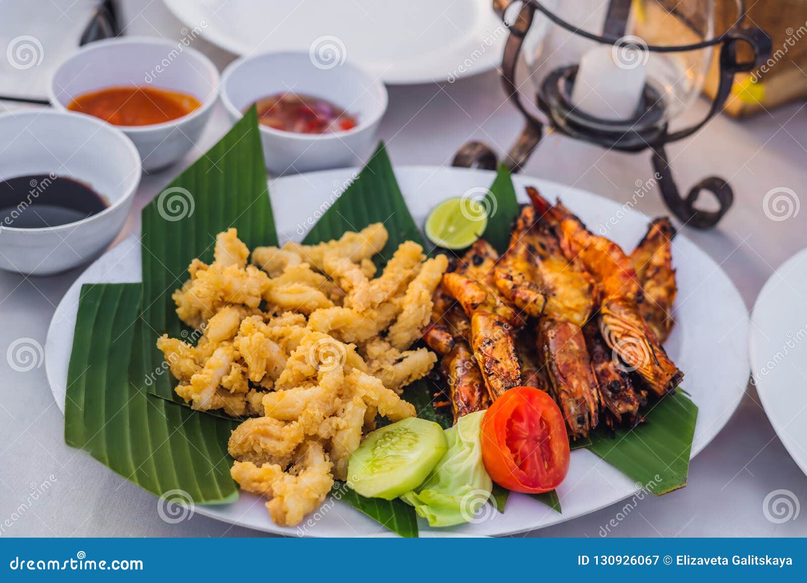 Fried Seafood for Lunch in Jimbaran Bay, Bali Stock Image - Image of ...