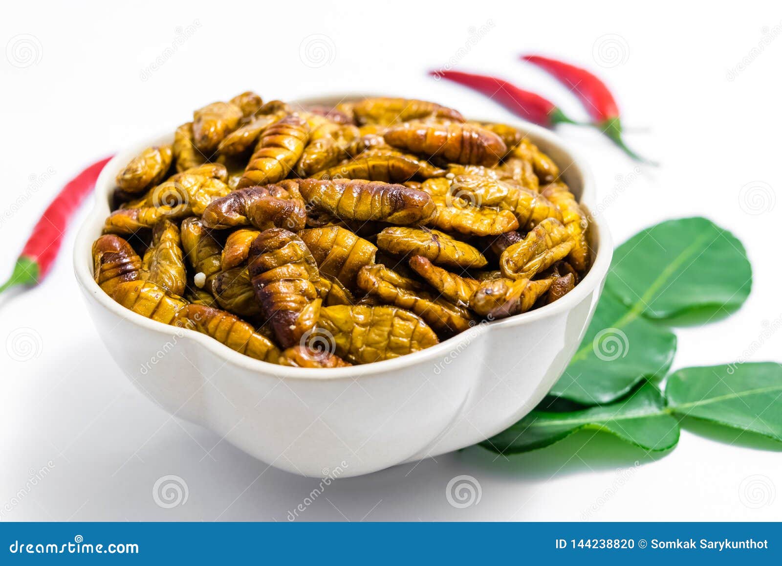 Fried silkworm`s pupa stock photo. Image of food, green - 144238820