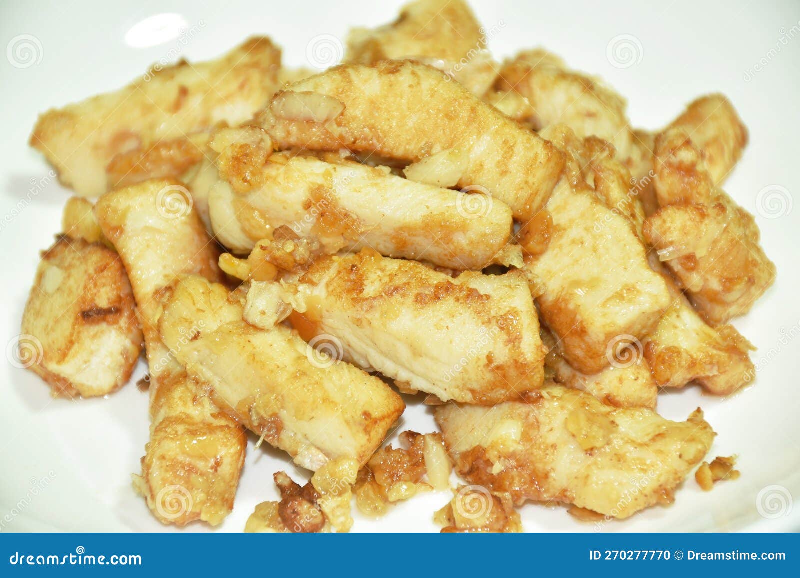 Fried Slice Chicken Meat with Salt and Garlic on Plate Stock Photo ...