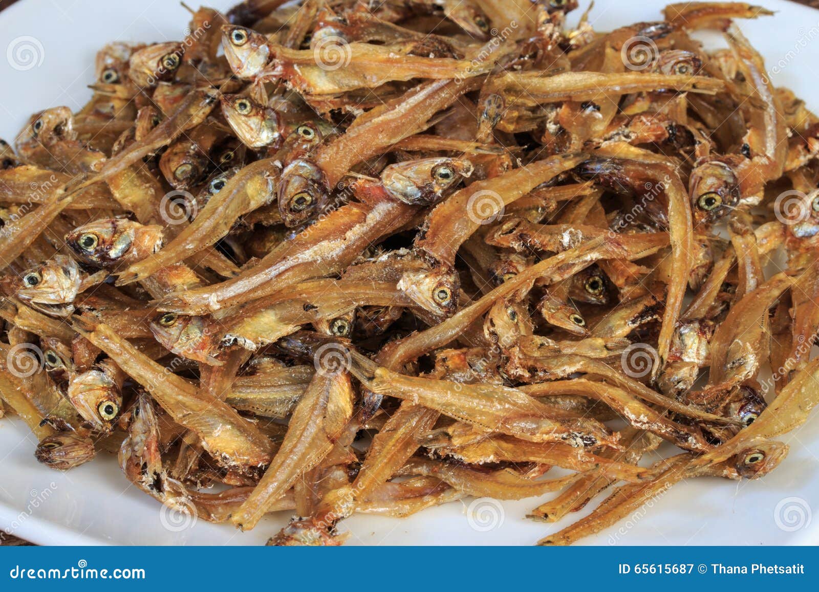 Fried small fish stock image. Image of crunchy, brown - 65615687