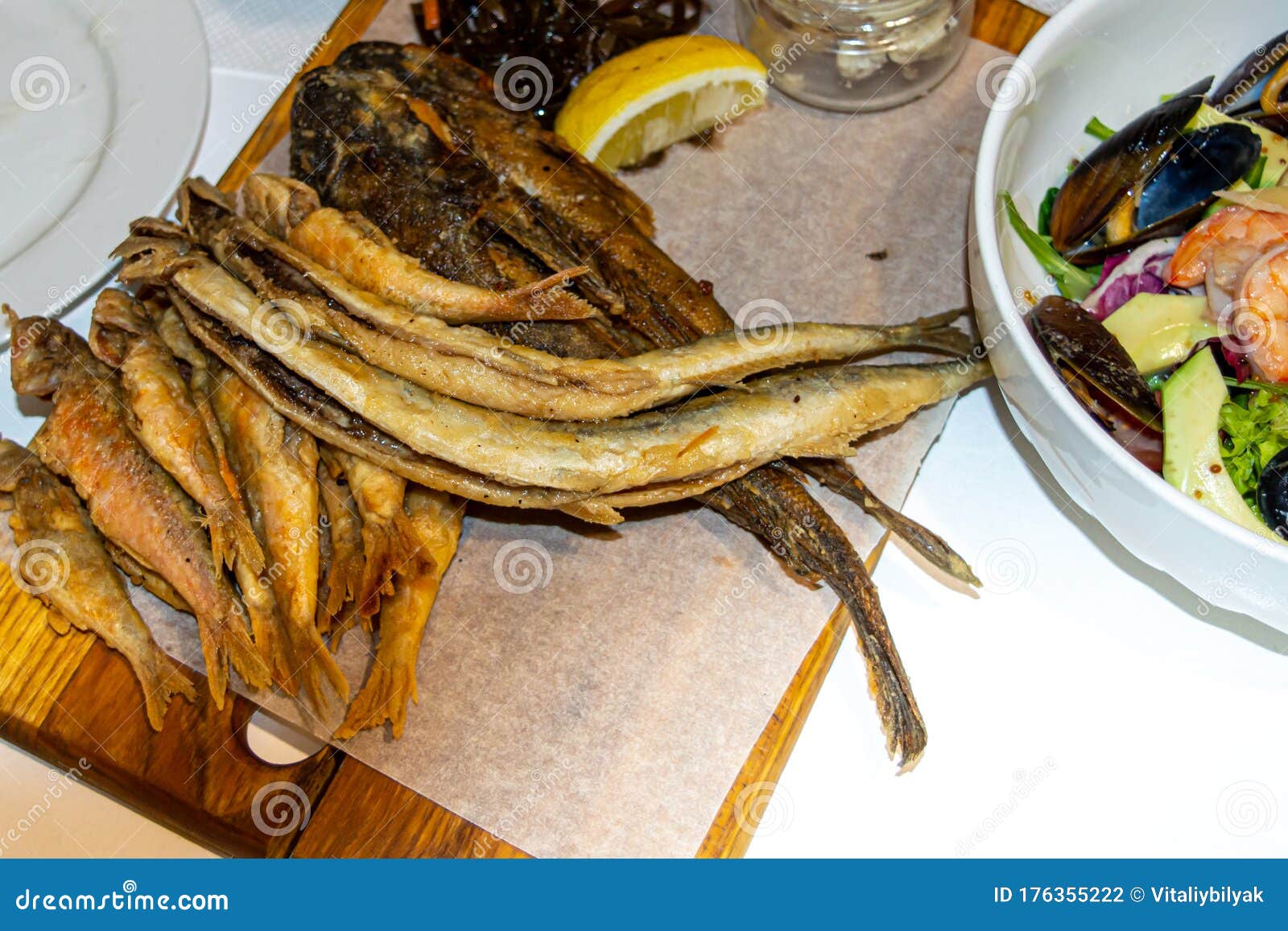 Fried small fish stock photo. Image of plate, cooking - 176355222