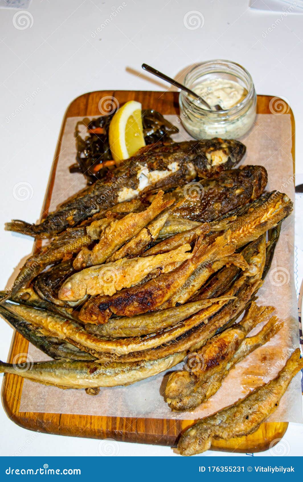 Fried small fish stock image. Image of brown, chips - 176355231