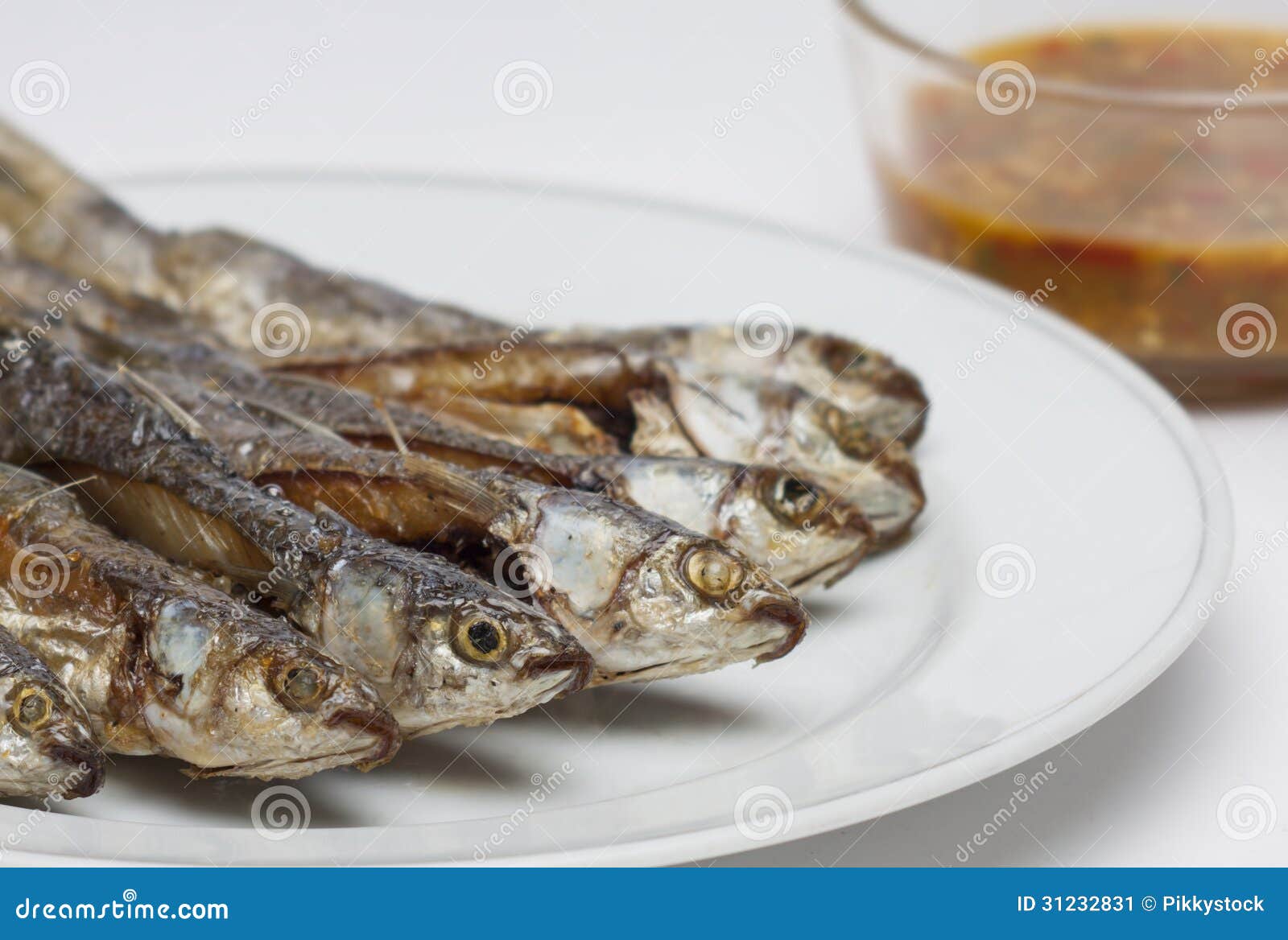 Fried small fish stock image. Image of closeup, crispy - 31232831