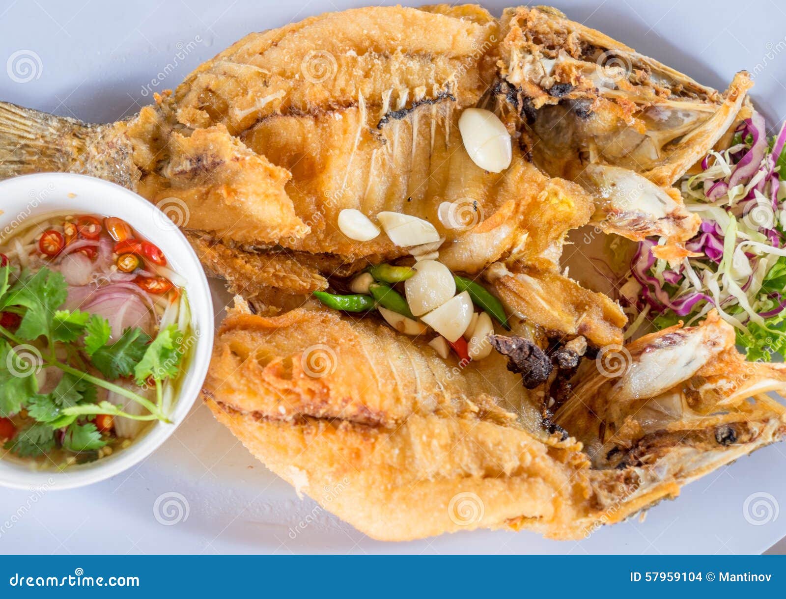 Fried Snakehead Fish with Fish Sauce Stock Photo - Image of parsley ...