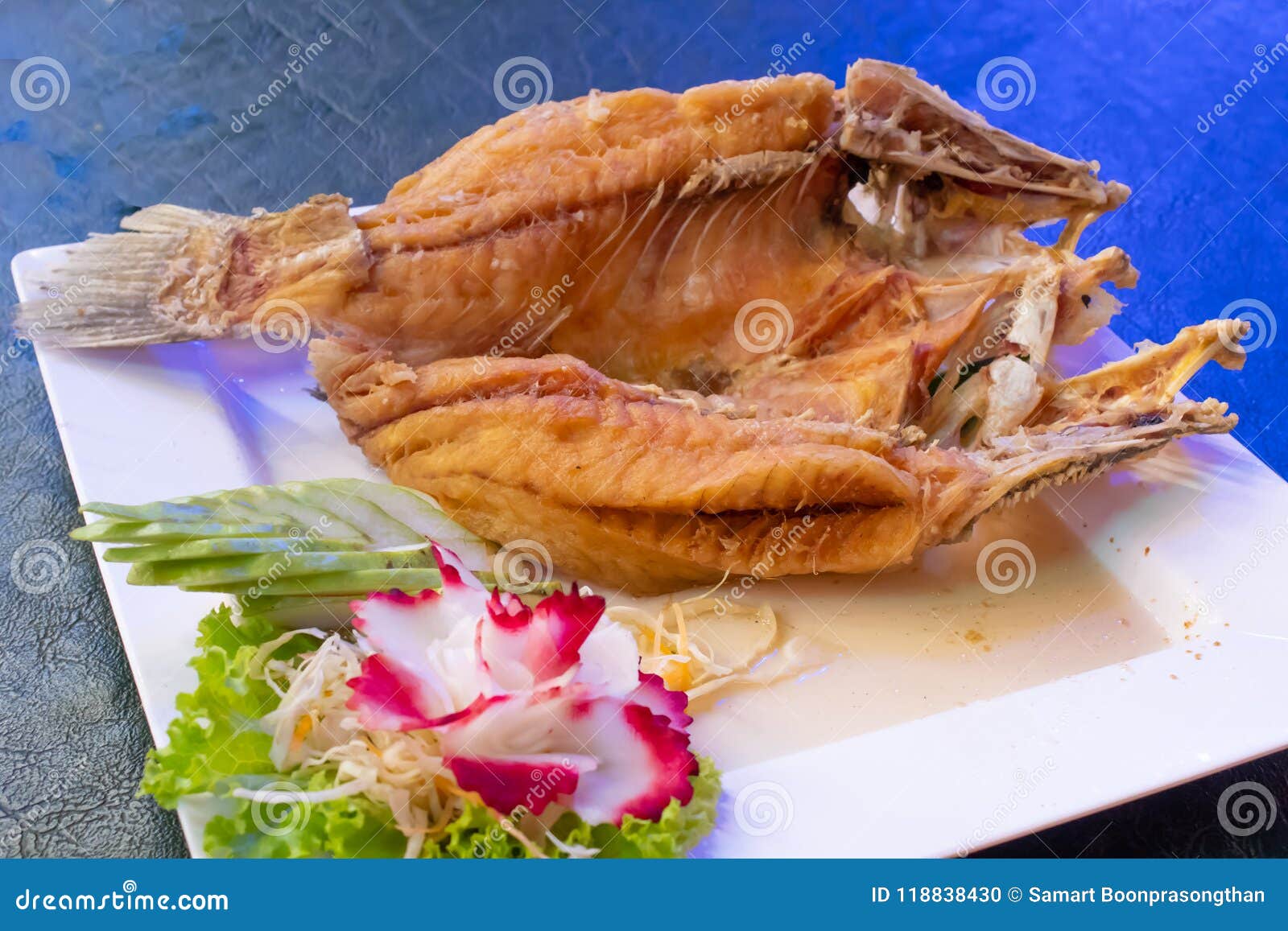 Fried Snapper Fish with Seafood Sauce and Vegetables. Stock Photo ...