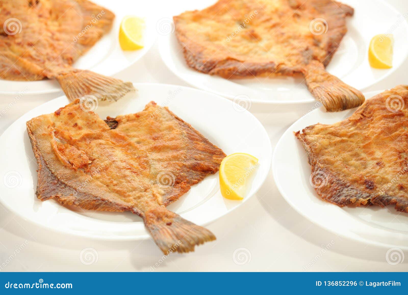Fried Sole Fish on White Plate with Lemon Stock Photo - Image of flat ...