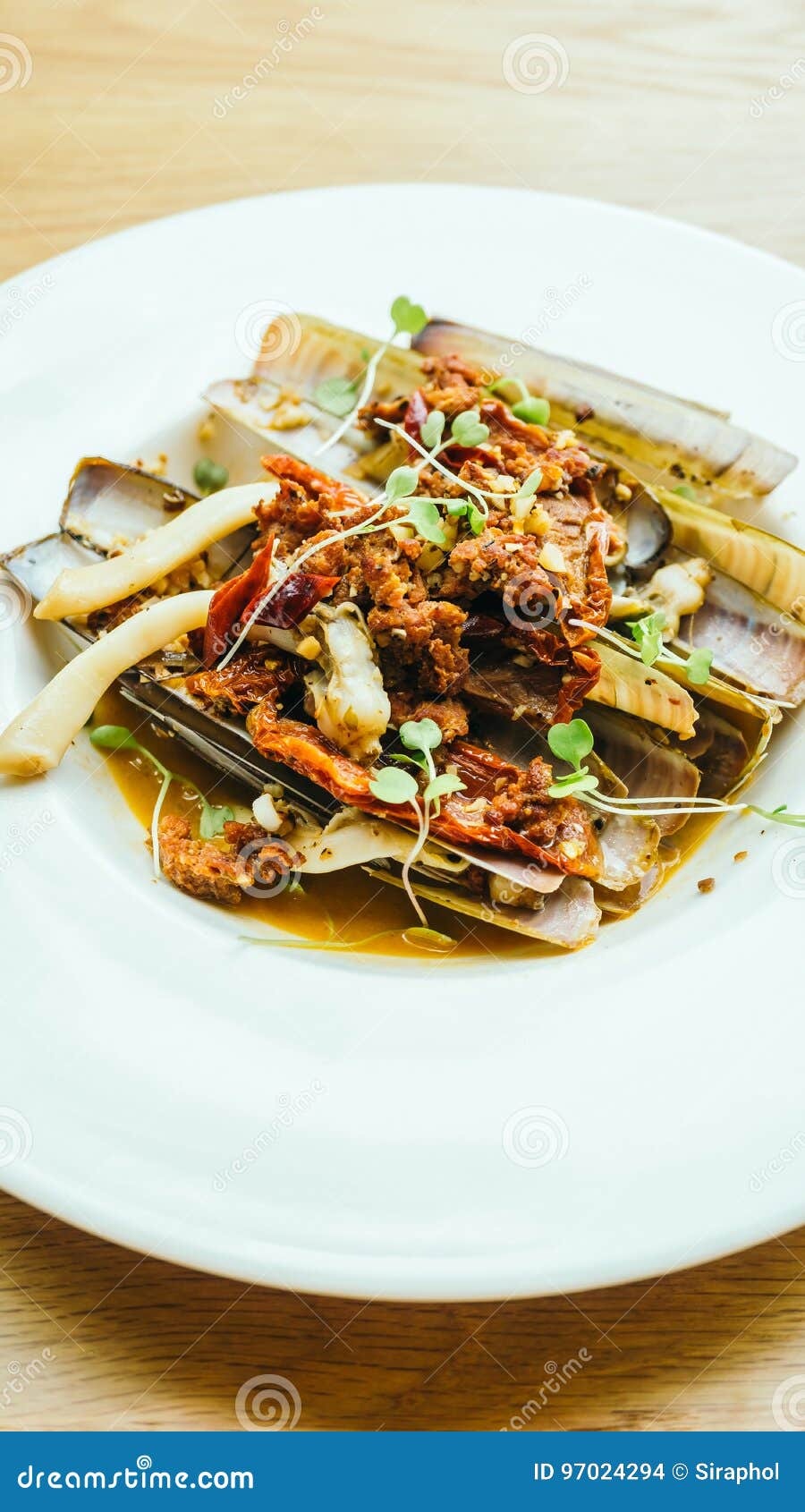 Fried spicy razor clams stock photo. Image of cooked - 97024294