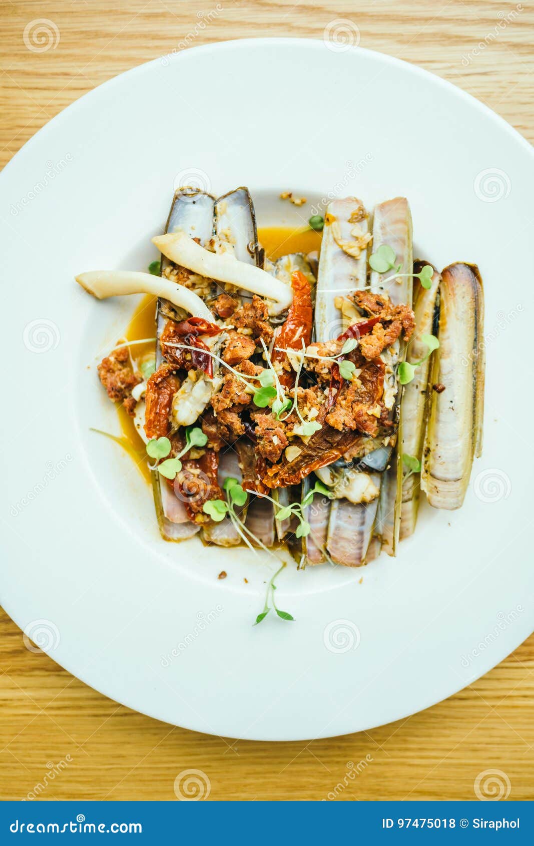 Fried spicy razor clams stock photo. Image of studio - 97475018