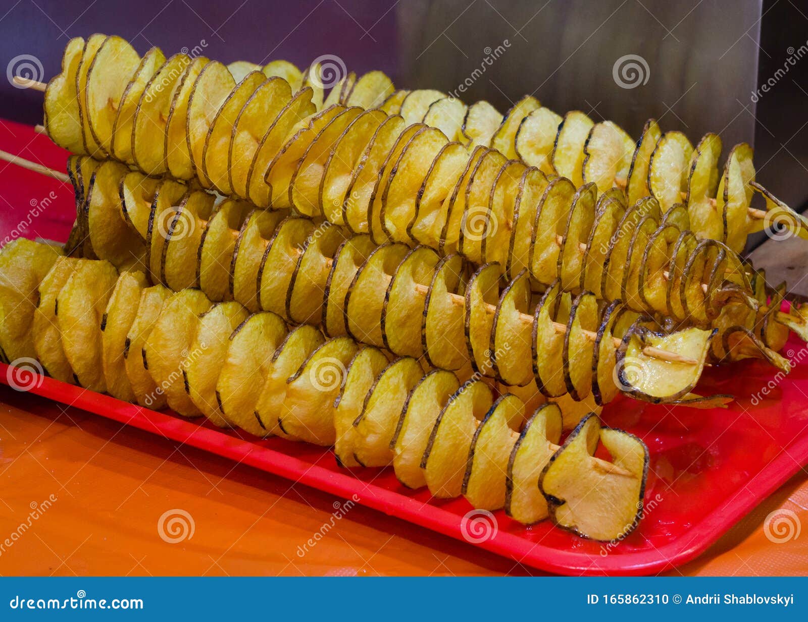 Fried, Spiral Potatoes. Street Cuisine at the Festival Close-up Stock ...