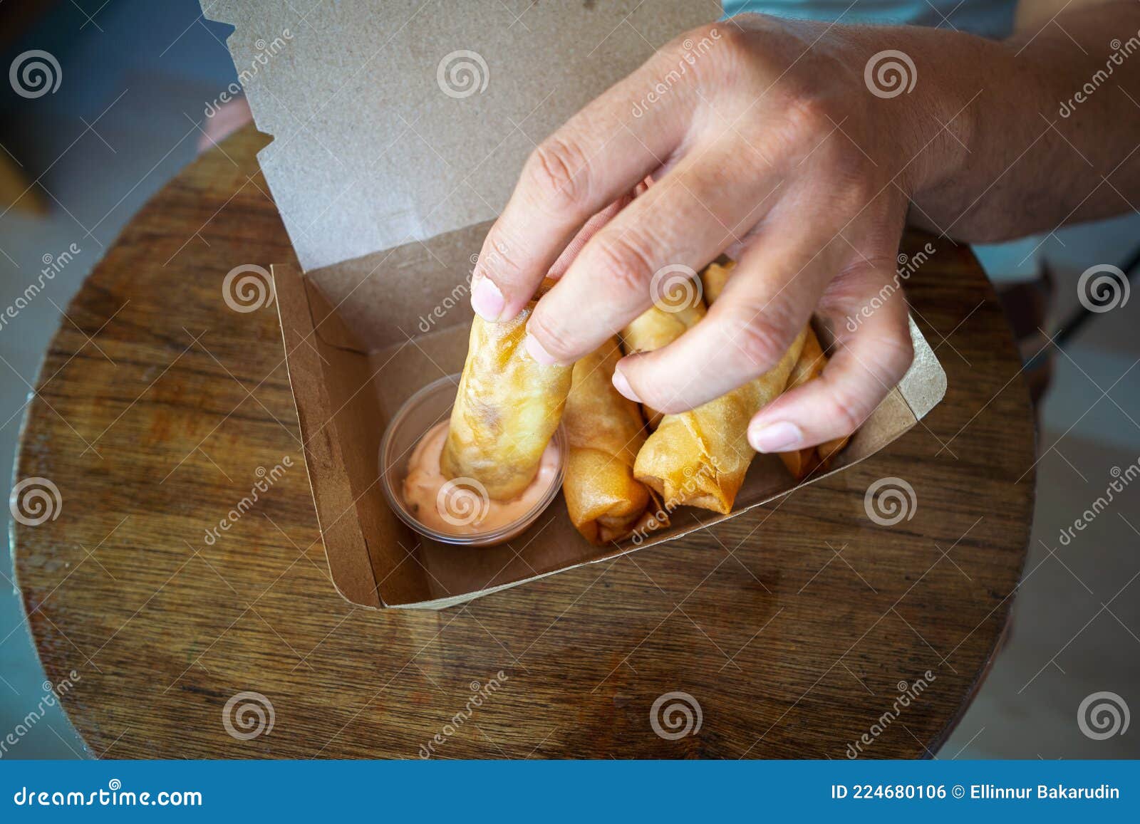 Fried Spring Rolls in a Brown Takeaway Container with Creamy Sauce ...