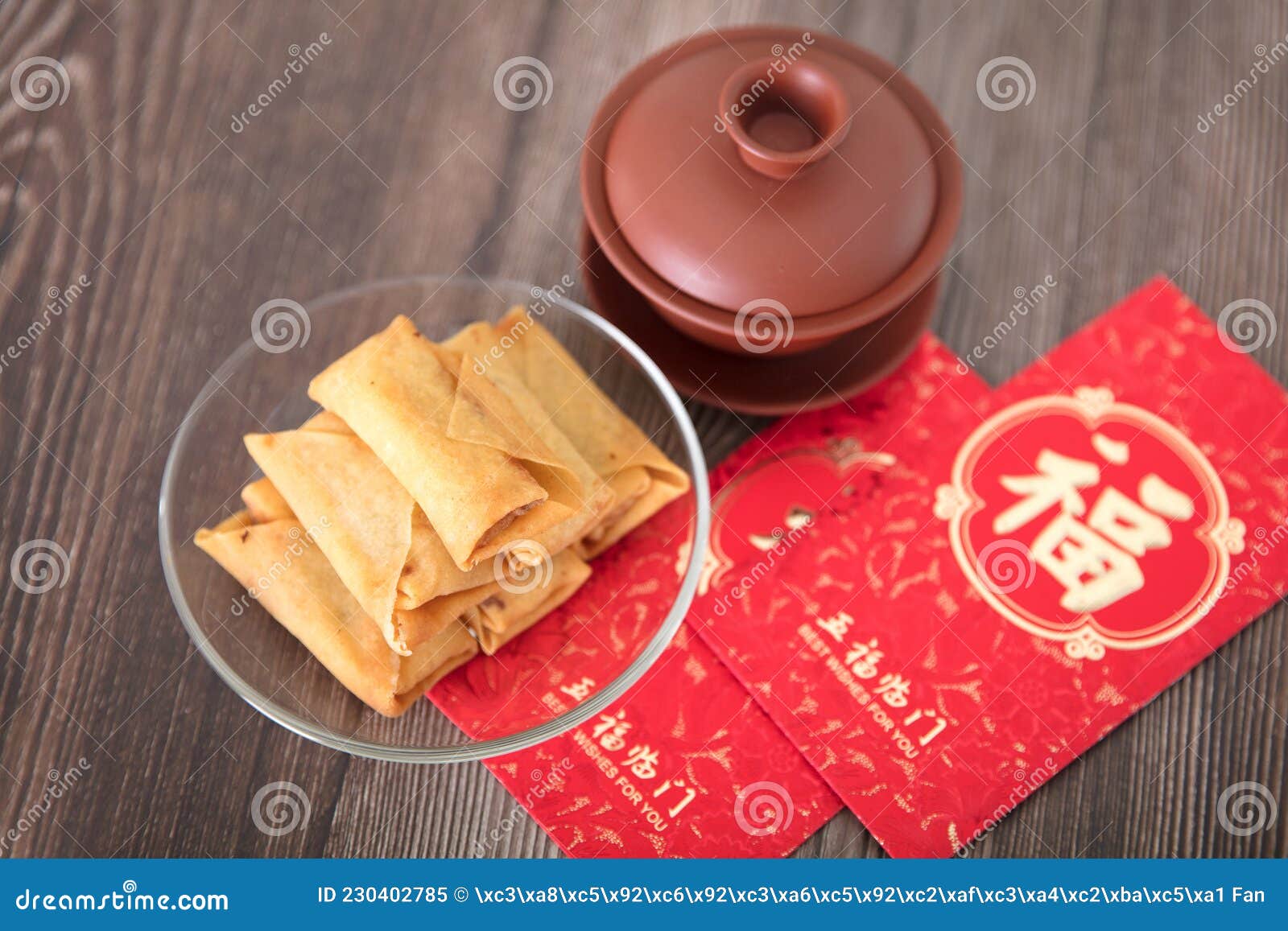 Fried Spring Rolls, Tea and Red Envelopes on the Table at the Beginning ...