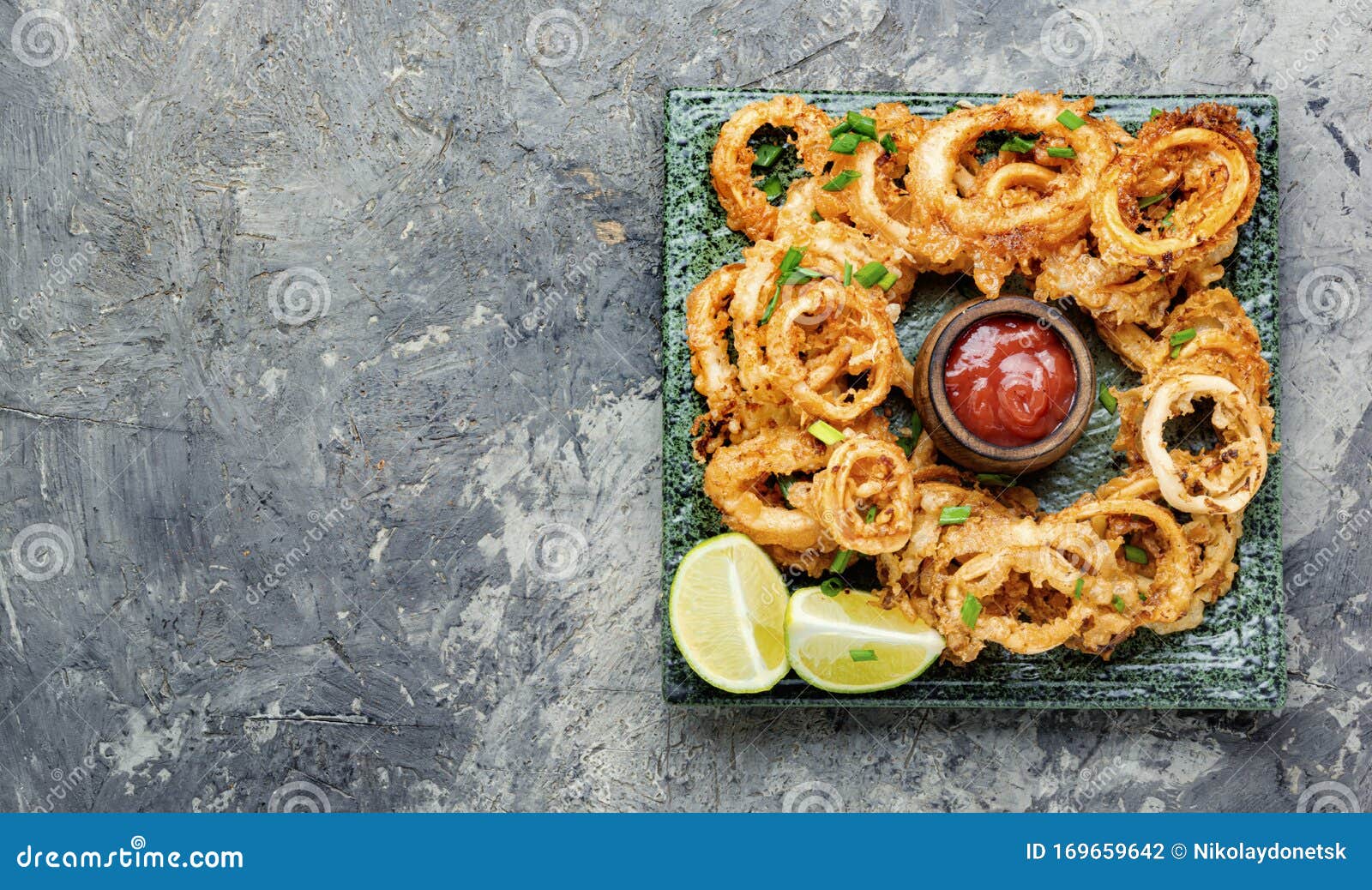 Fried squid rings breaded stock photo. Image of crunchy - 169659642
