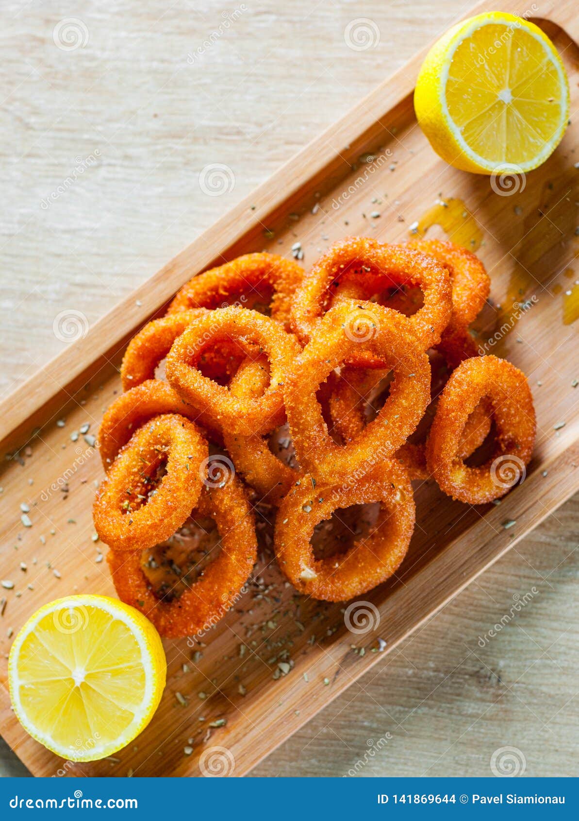 Fried Squid Rings Breaded with Lemon Stock Photo - Image of food ...