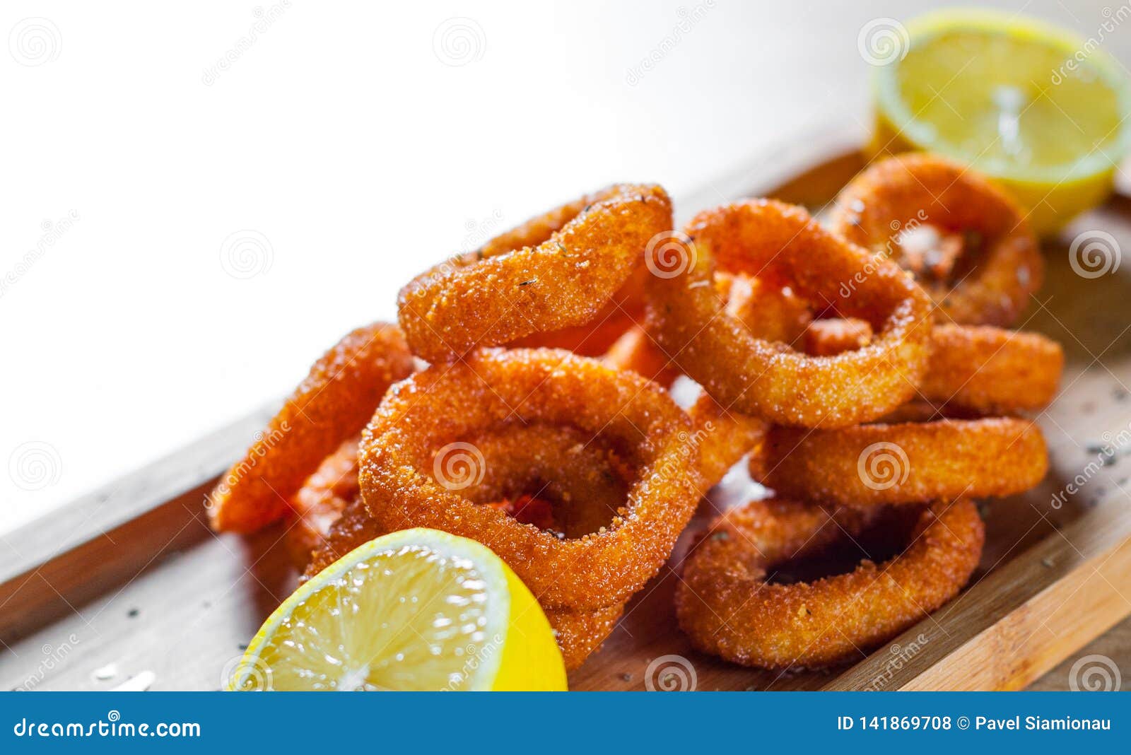 Fried Squid Rings Breaded with Lemon Stock Photo - Image of fast, plate ...