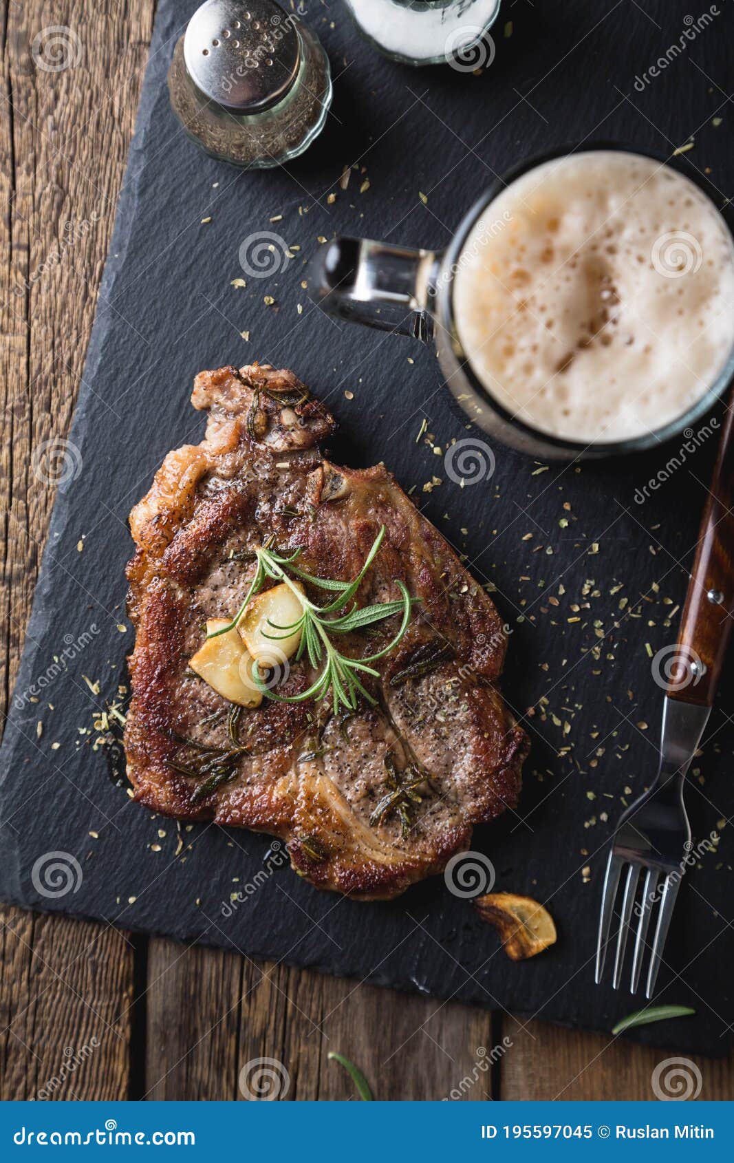 Fried steak with dark beer stock image. Image of steak - 195597045