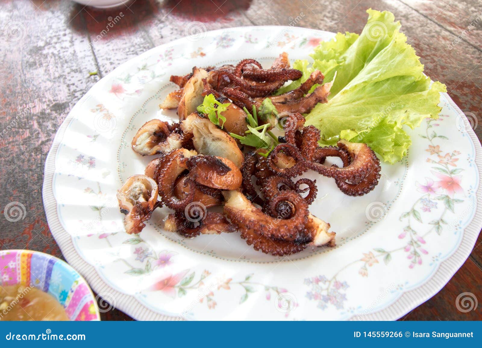 Fried Sun Dried Calamari in Restaurant Stock Photo - Image of dried ...