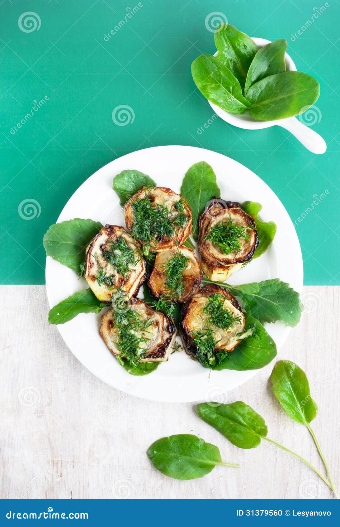 Fried Vegetable Marrow with Dill and Garlic on the Round White P Stock ...