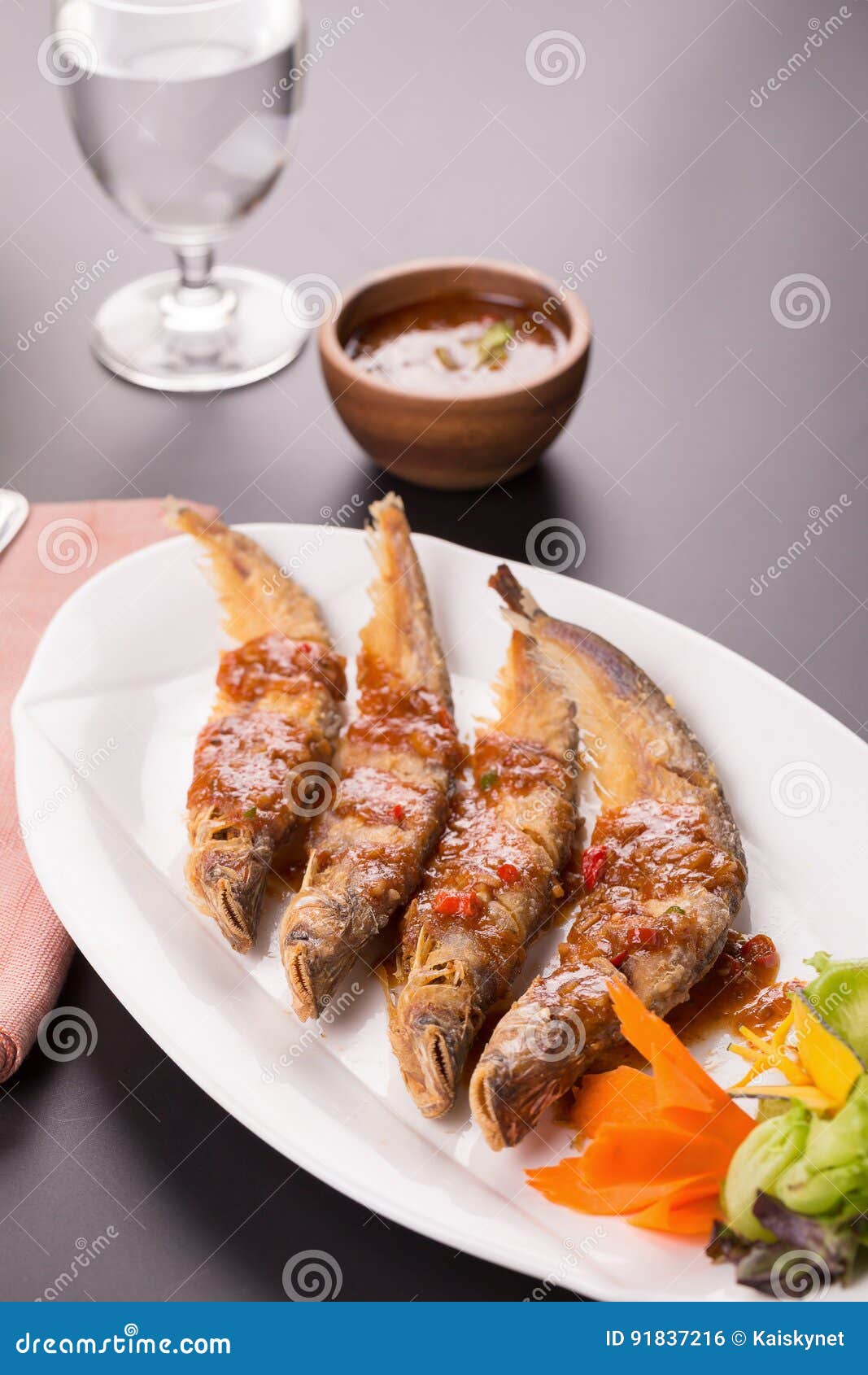 Fried Whisker Sheat Fish With Chili Sauce Royalty-Free Stock ...