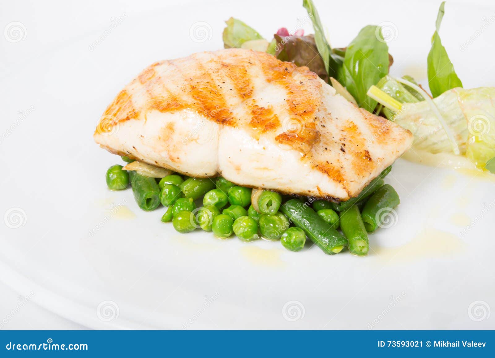 Fried White Fish Fillet with Garnish Stock Image - Image of arugula ...