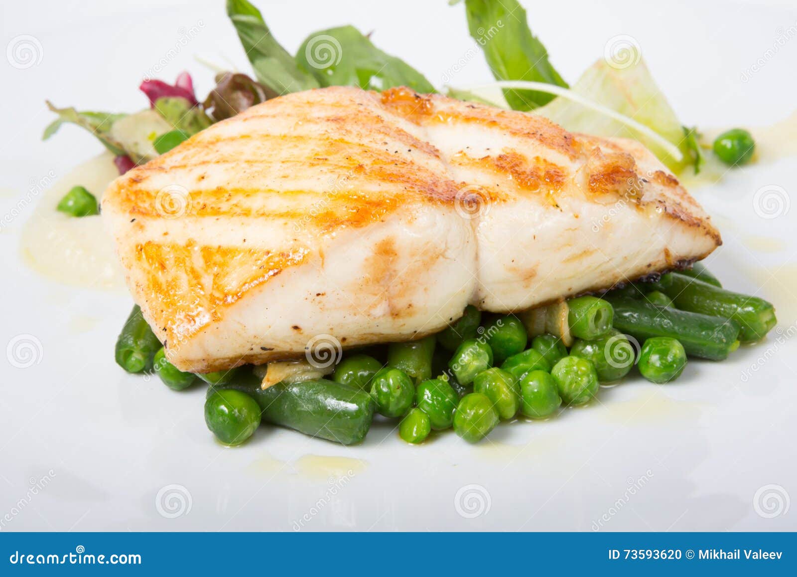 Fried White Fish Fillet with Garnish Stock Photo - Image of food, fish ...