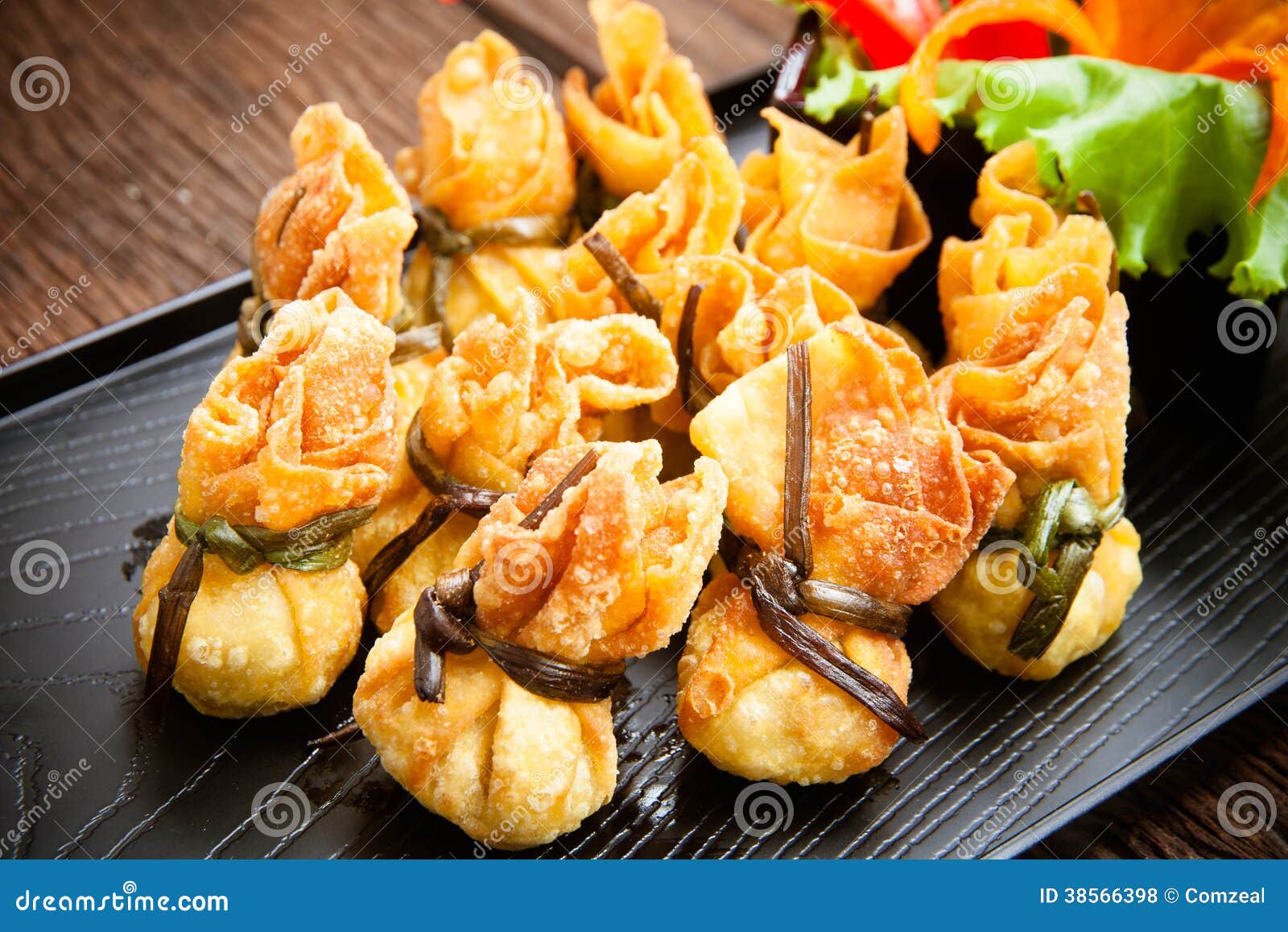 Fried Wonton Or Toong Tong Isolated On Wood Background Stock Photo ...
