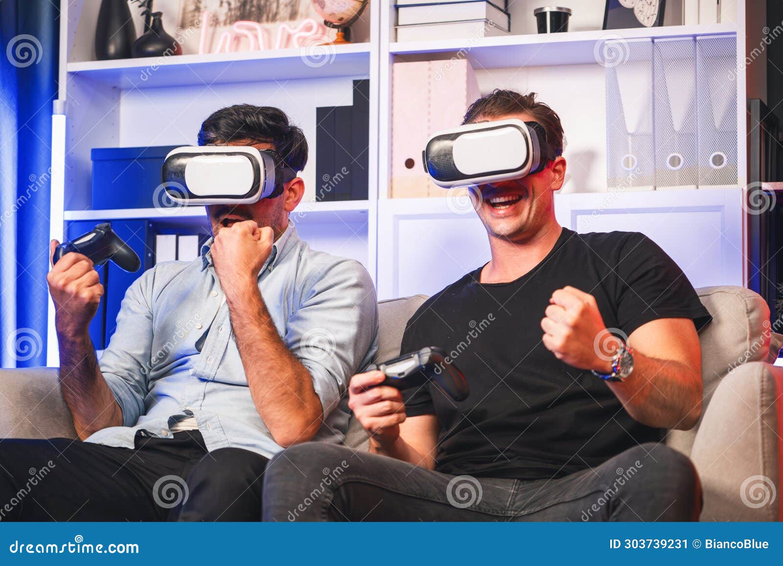 Friend Gamers Playing Video Game Using Joysticks and VR Headset ...