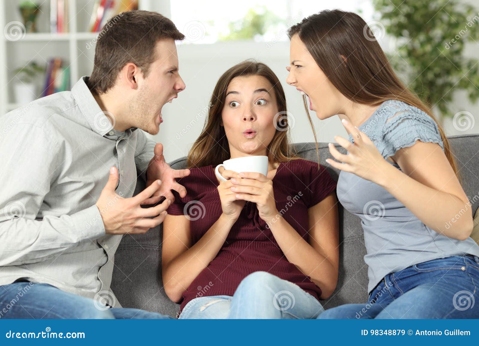Friend in the Middle of a Couple Argument Stock Image - Image of anger ...