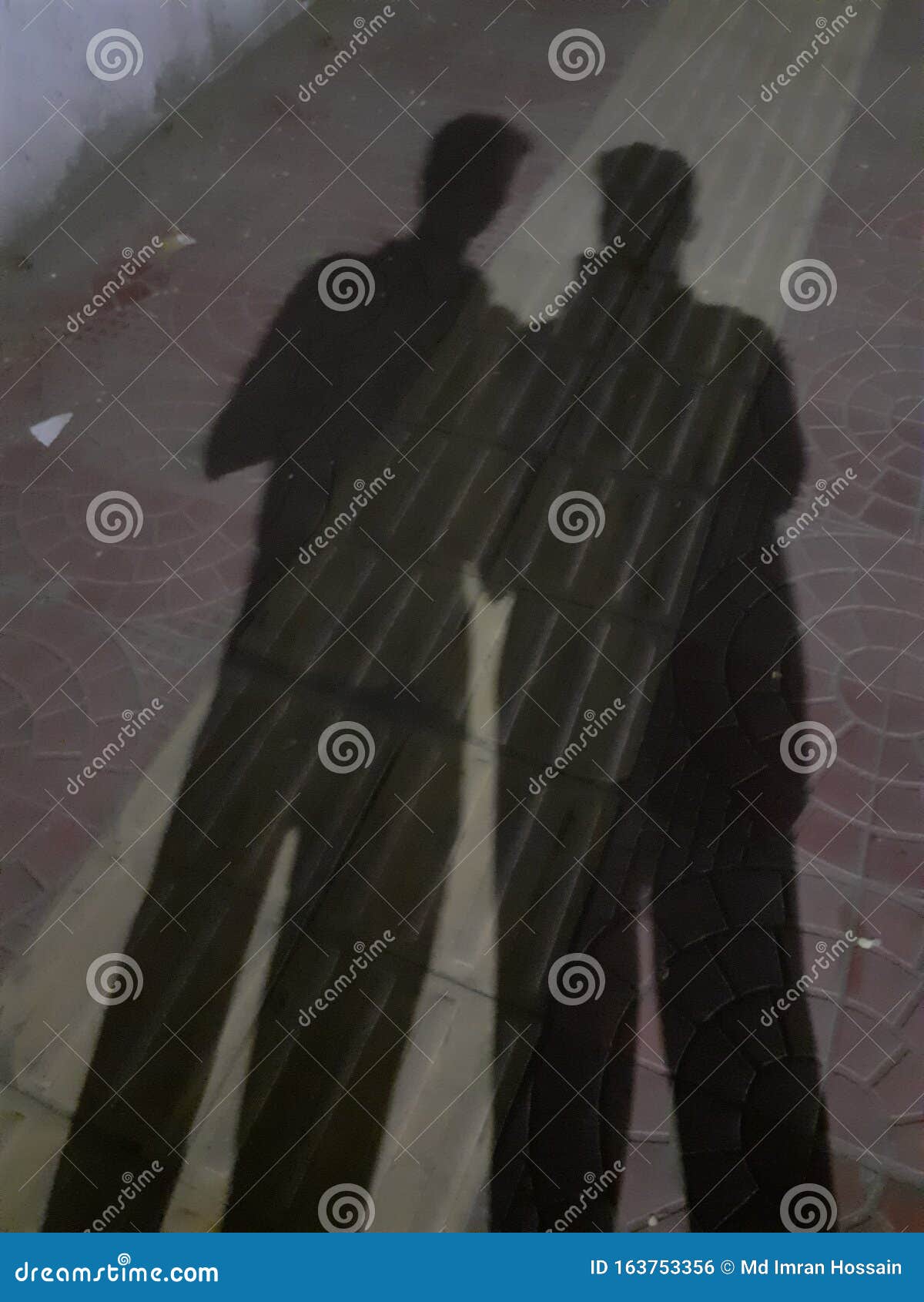 Friends shadow stock photo. Image of nightwalk, friends - 163753356