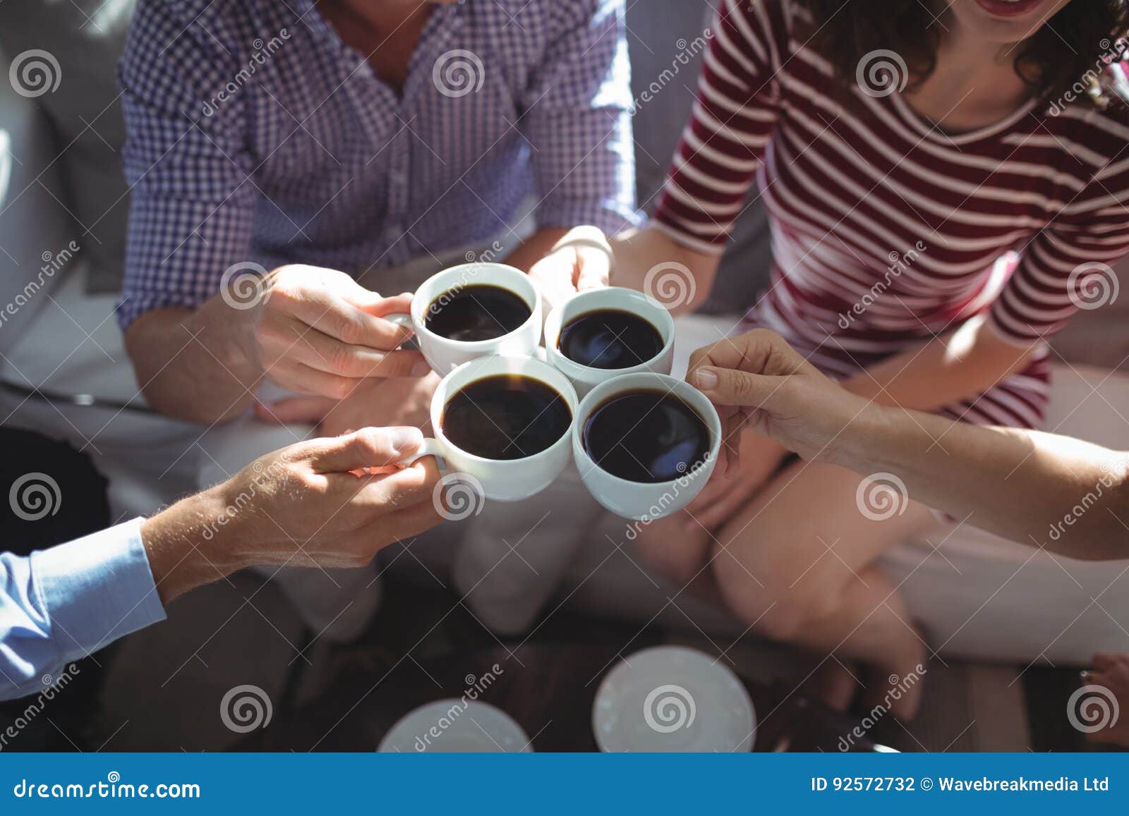 Friend Toasting Coffee Cups Together Stock Photo - Image of caucasian ...