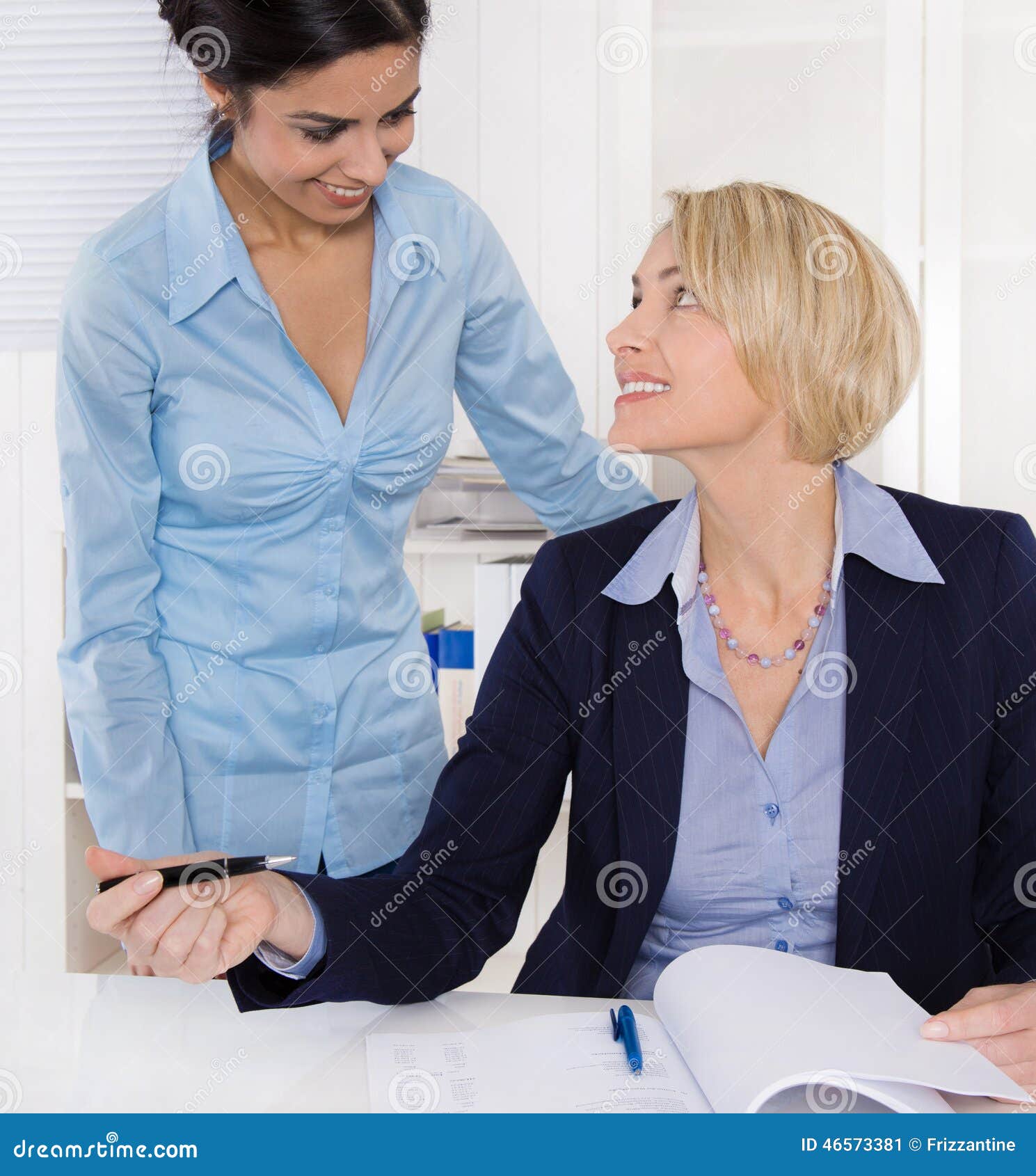 Friendly Atmosphere at Work: Two Smiling Businesswoman. Stock Image ...