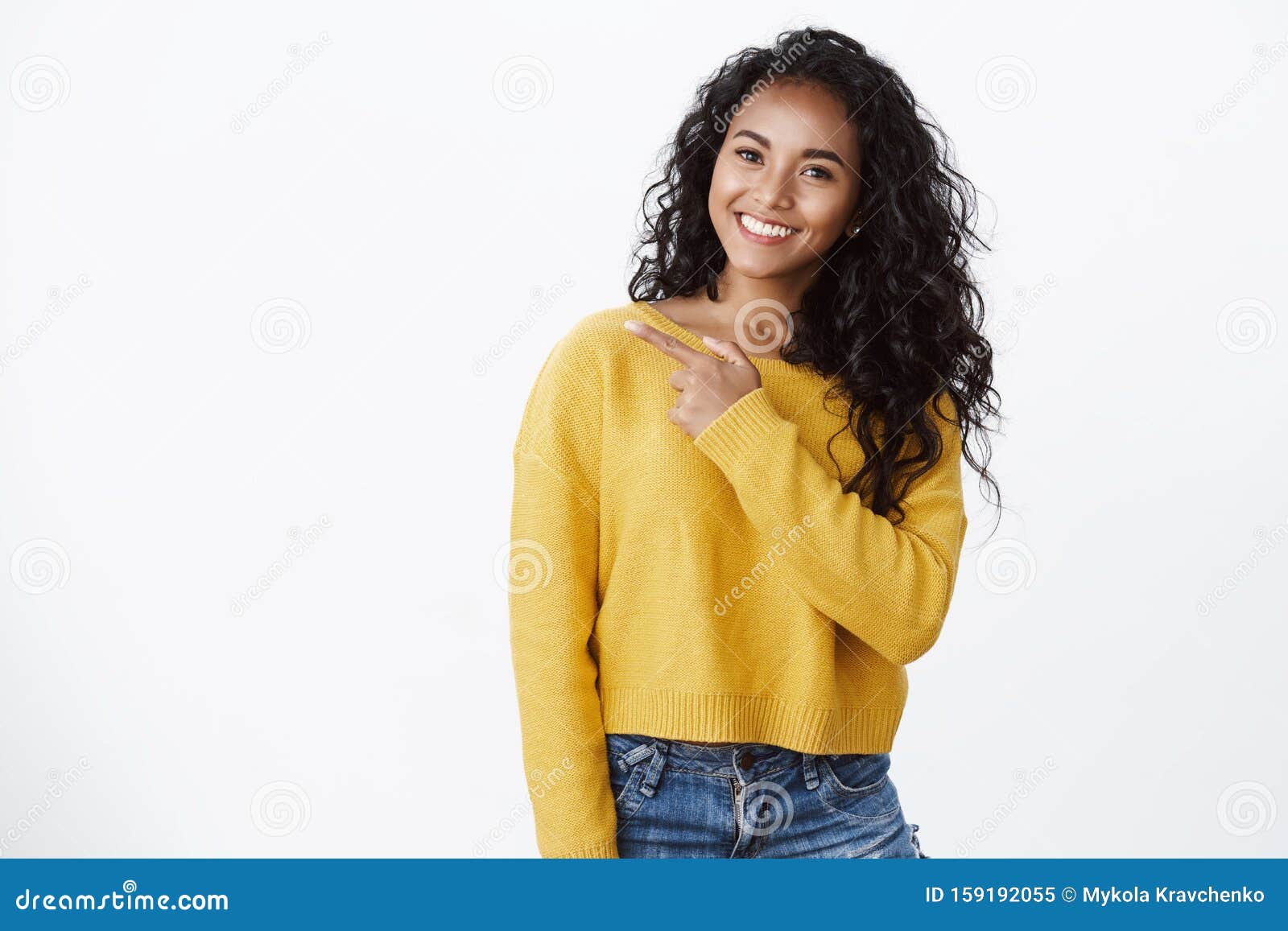 Friendly Attractive African American Woman In Yellow Stylish Sweater