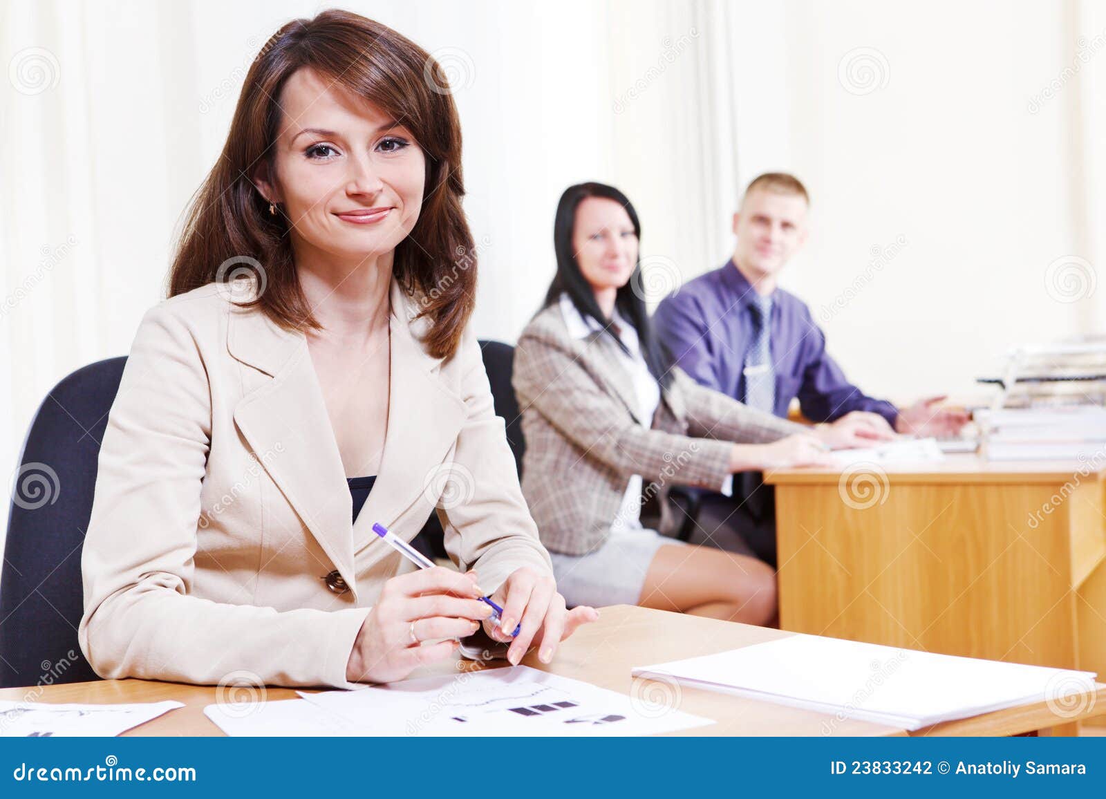 Friendly bank consultant stock photo. Image of paper - 23833242