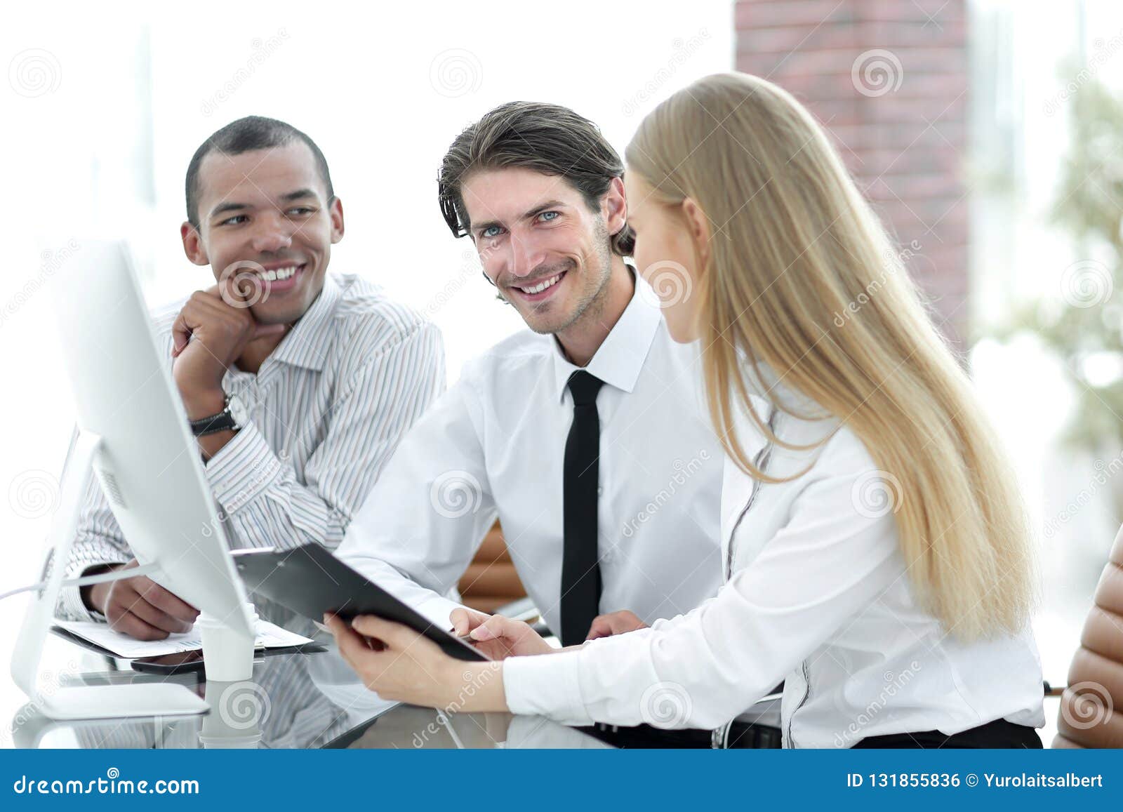 Friendly Business Team Discussing Promising Business Ideas. Stock Photo ... Friendly Business Team Discussing Promising Business Ideas. Stock Photo ...