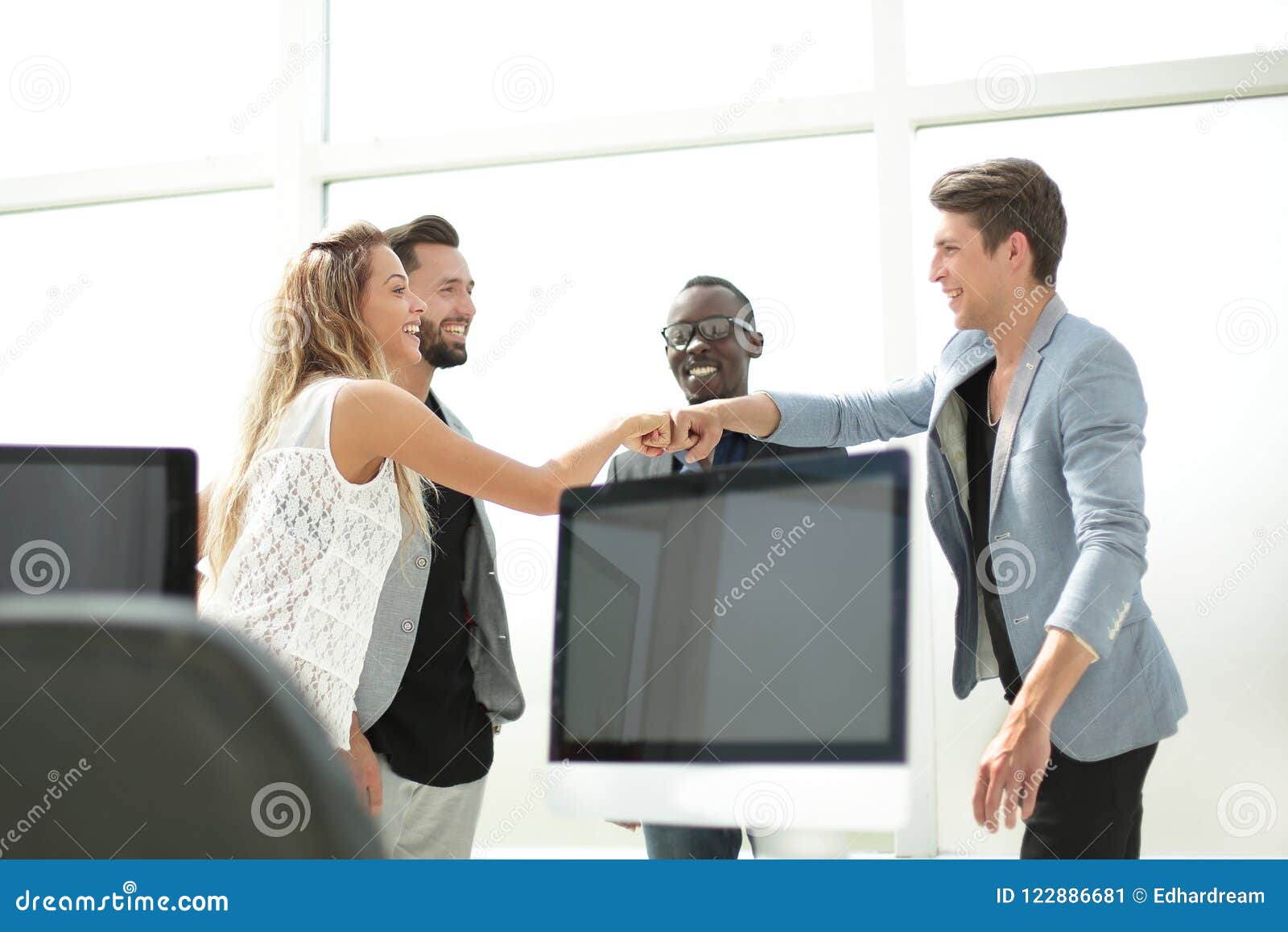 Friendly Business Team in a Modern Office Stock Image - Image of ...