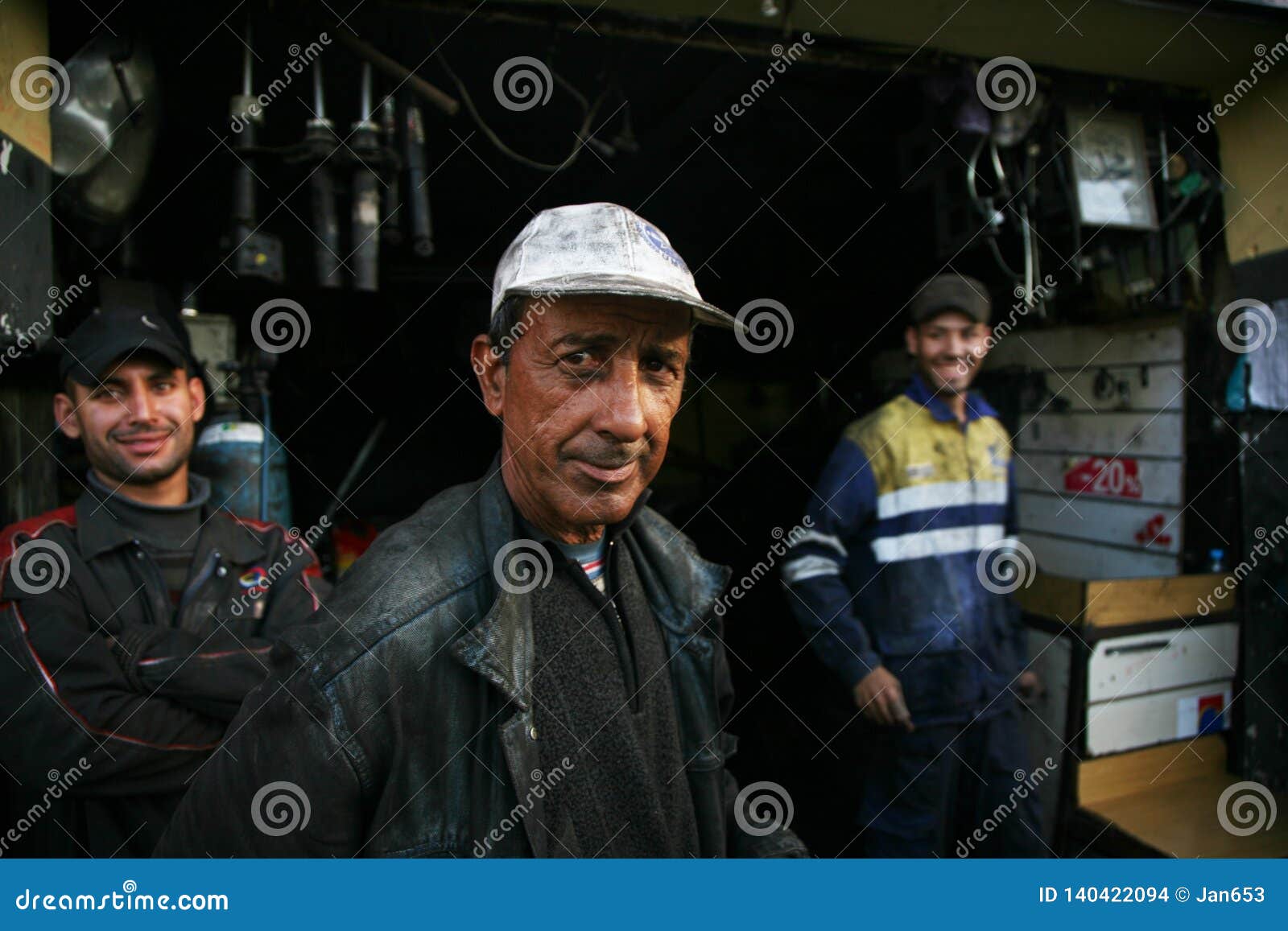 The Friendly Car Three Mechanics in Morocco. Editorial Stock Image ...