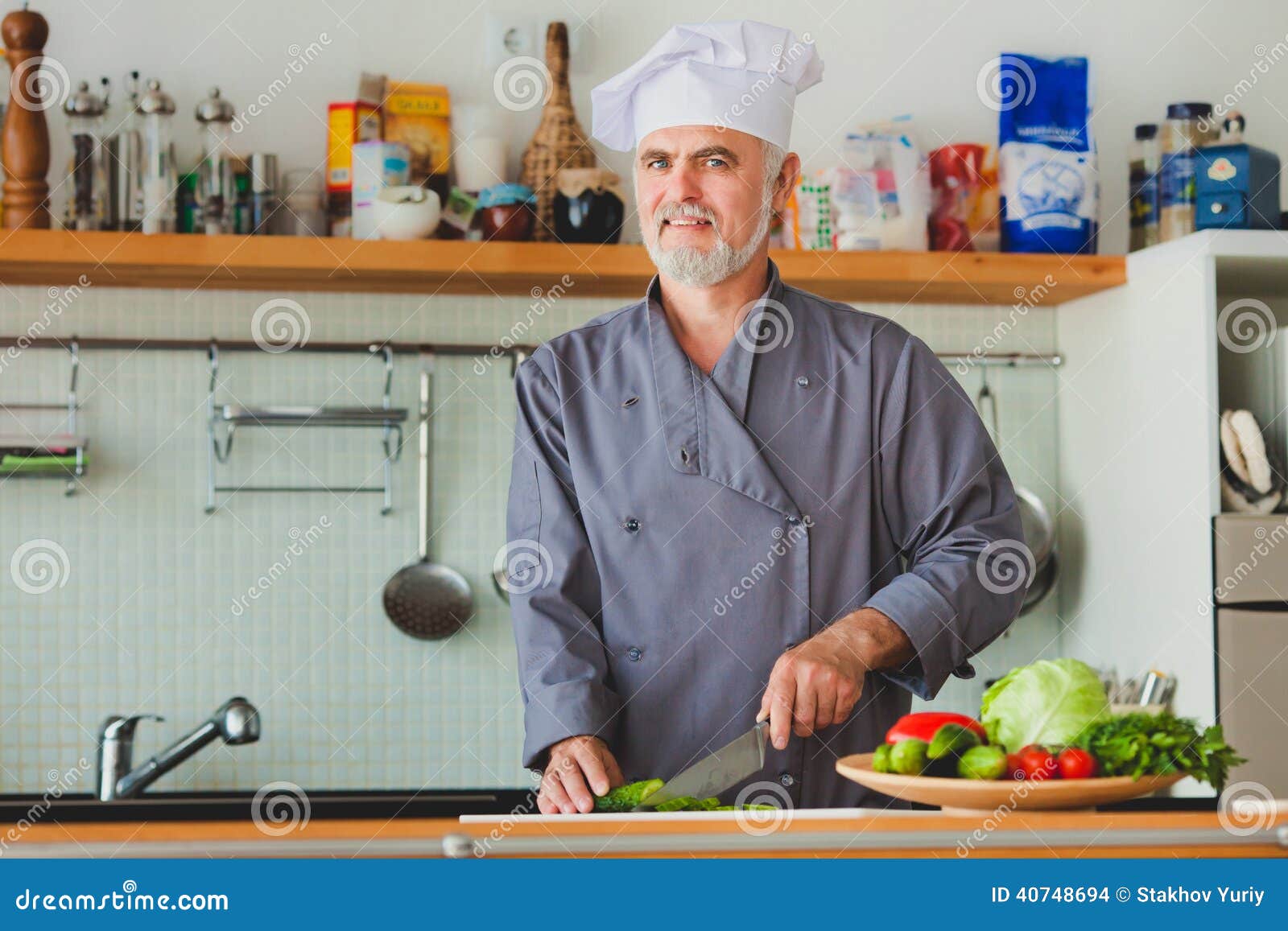 Friendly Chef Preparing Vegetables in His Kitchen Stock Photo - Image ...