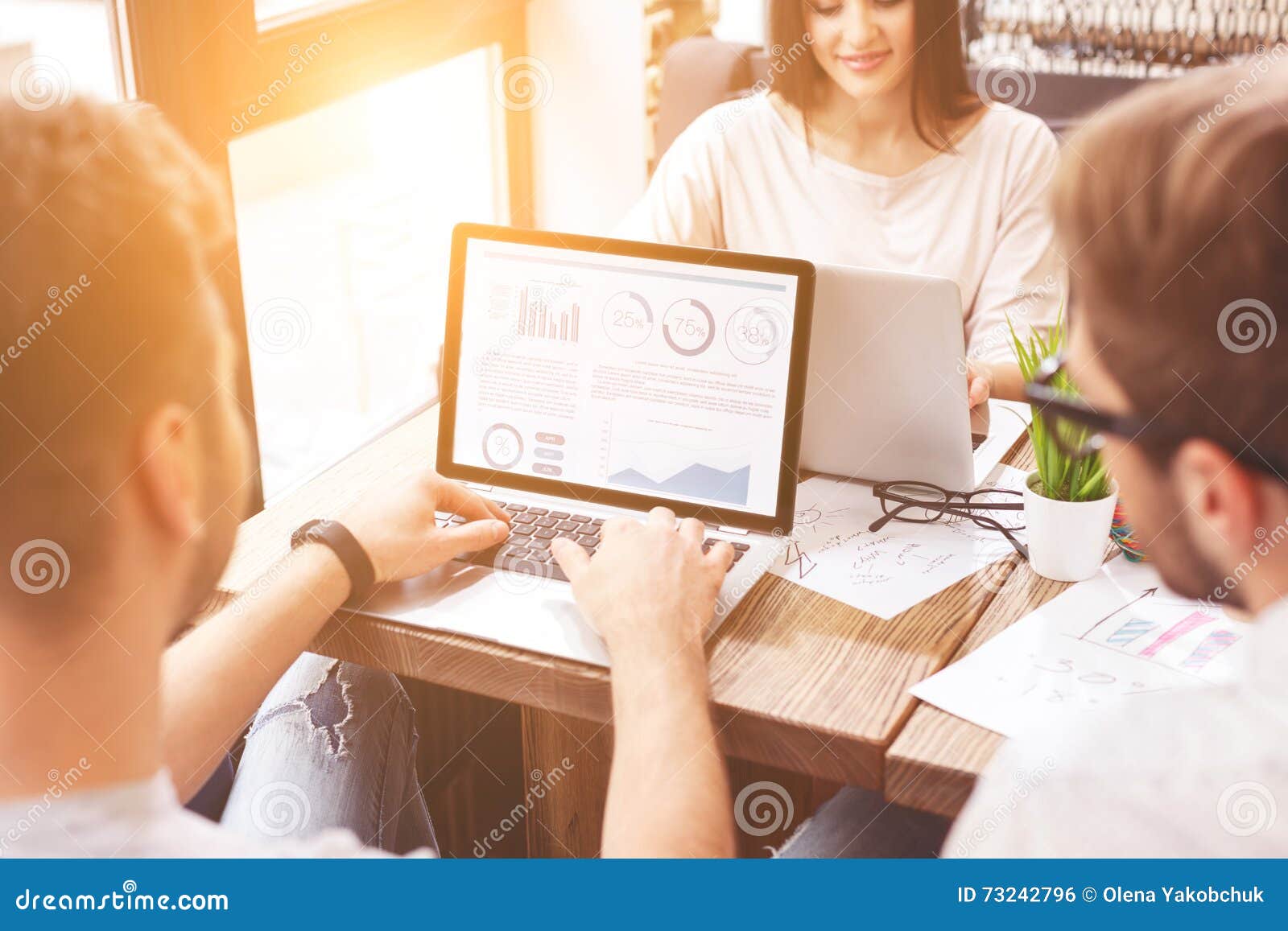 Friendly Colleagues Using Computers for Work Stock Photo - Image of ...