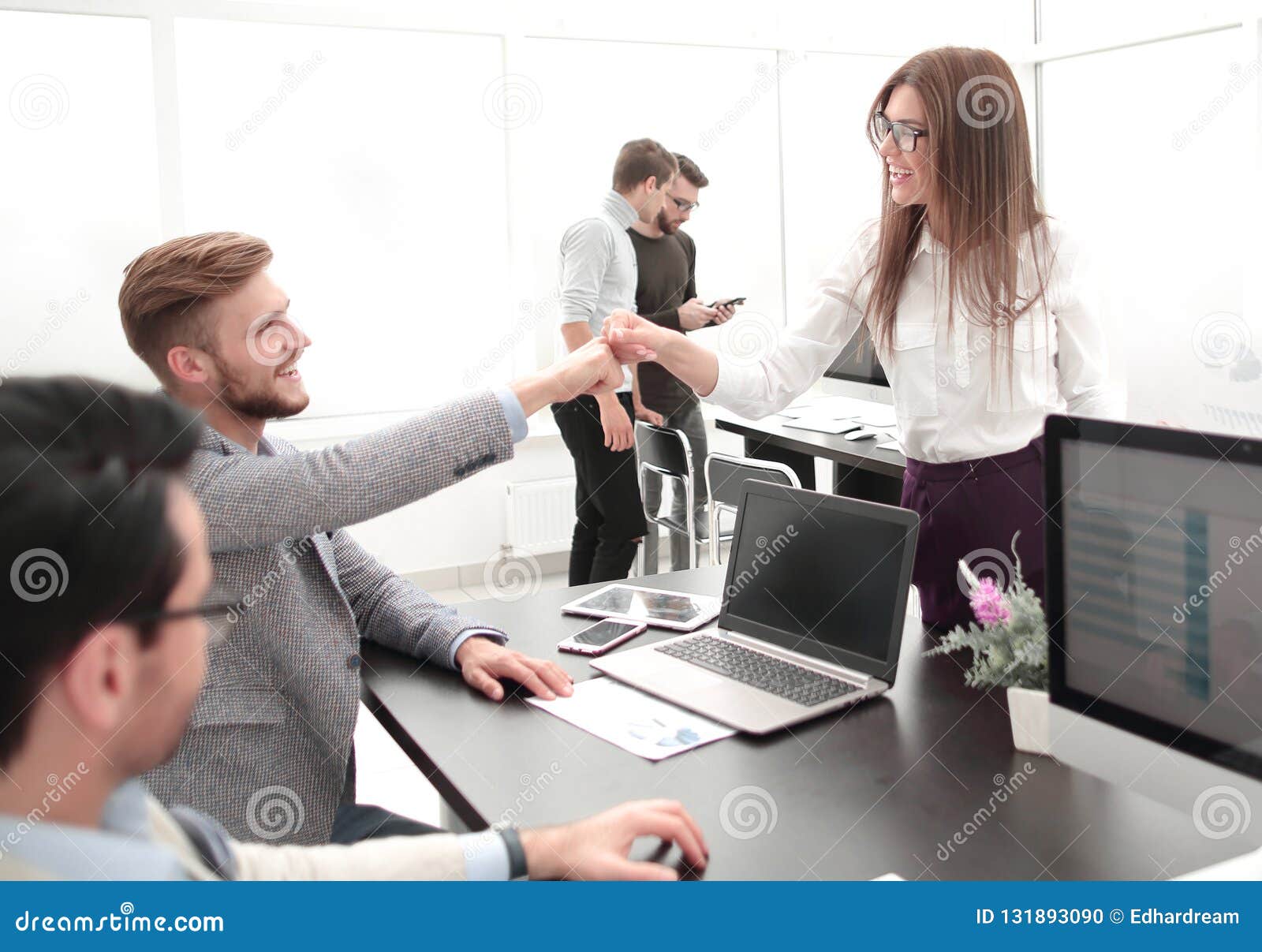 Friendly Colleagues in the Workplace. Stock Photo - Image of discussion ...
