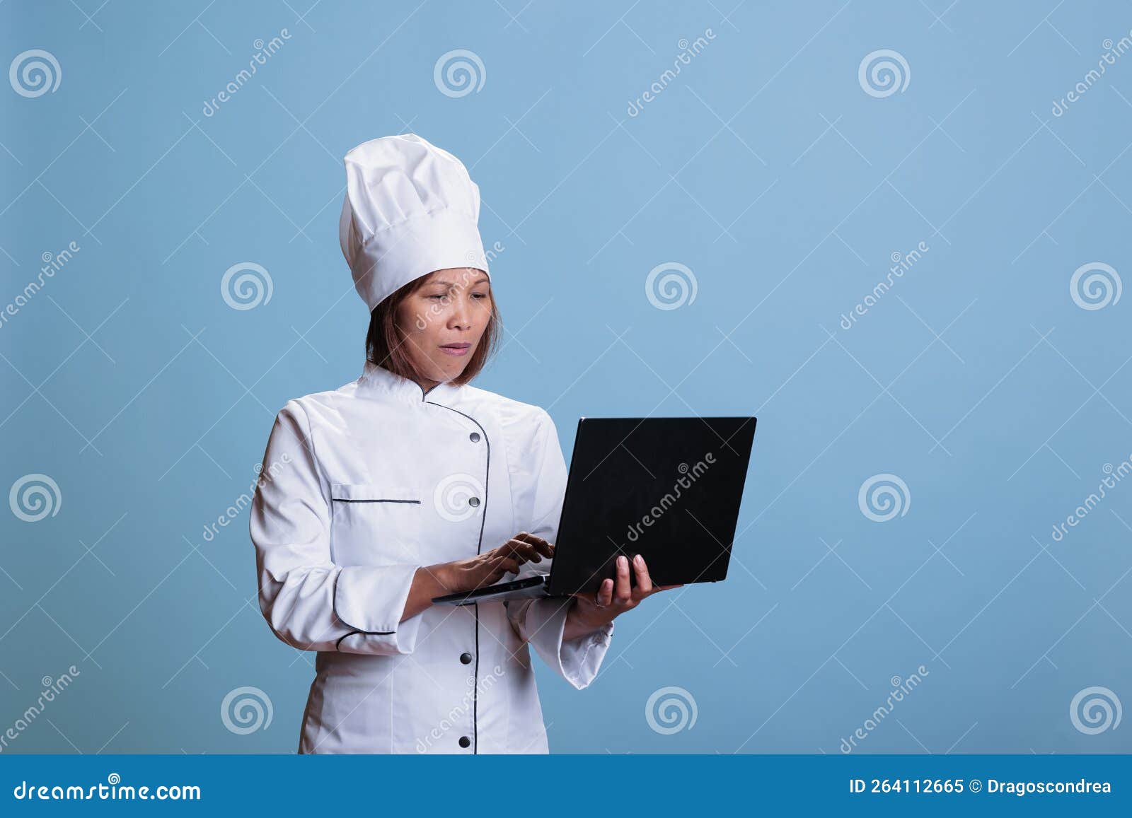 Friendly Cook Browsing Culinary Recipe on Laptop Computer Checking ...