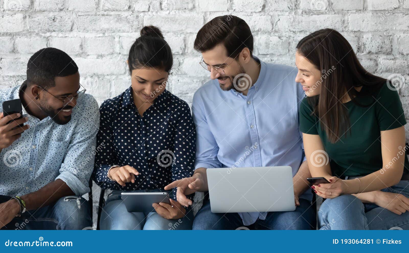 Friendly Diverse Candidates Talking, Using Mobile Devices, Waiting for ...