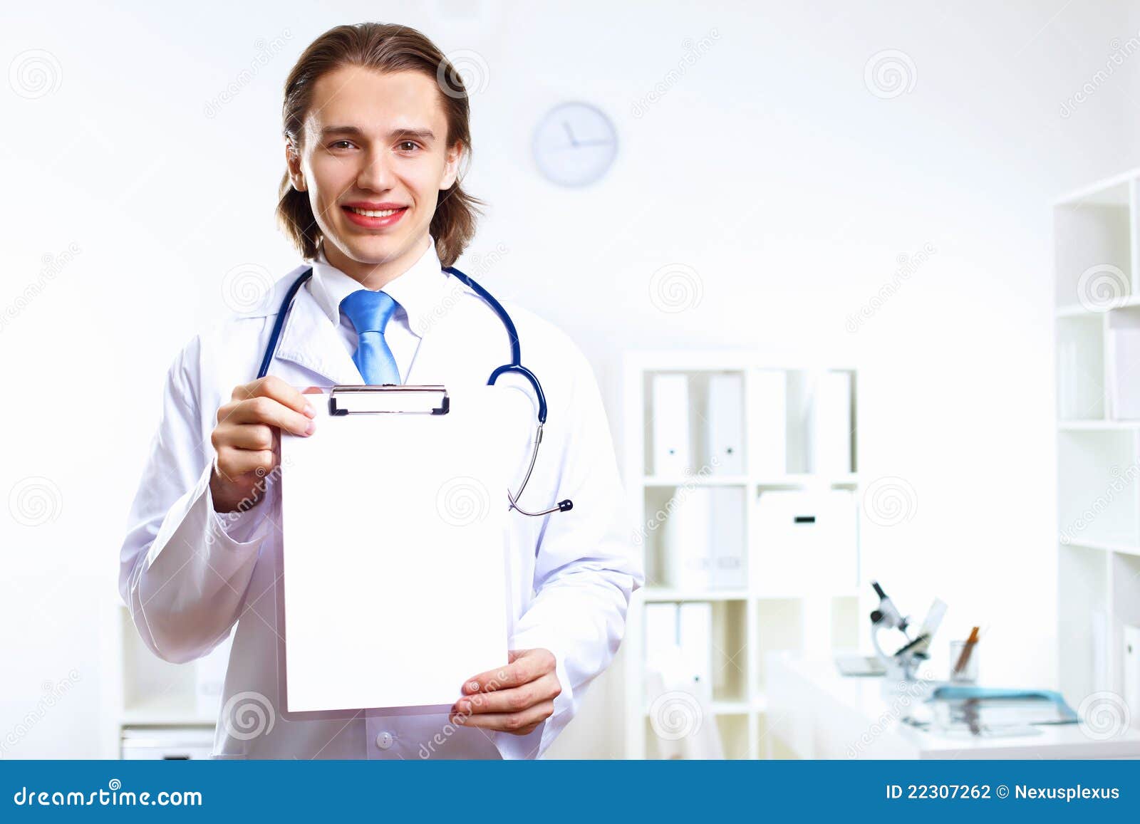 Friendly Doctor in Medical Office Stock Photo - Image of person ...