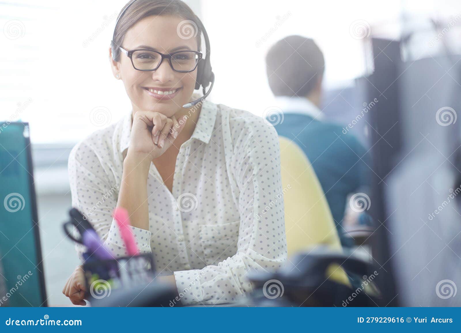 Friendly Face of Customer Service. an Attractive Young Customer Service ...