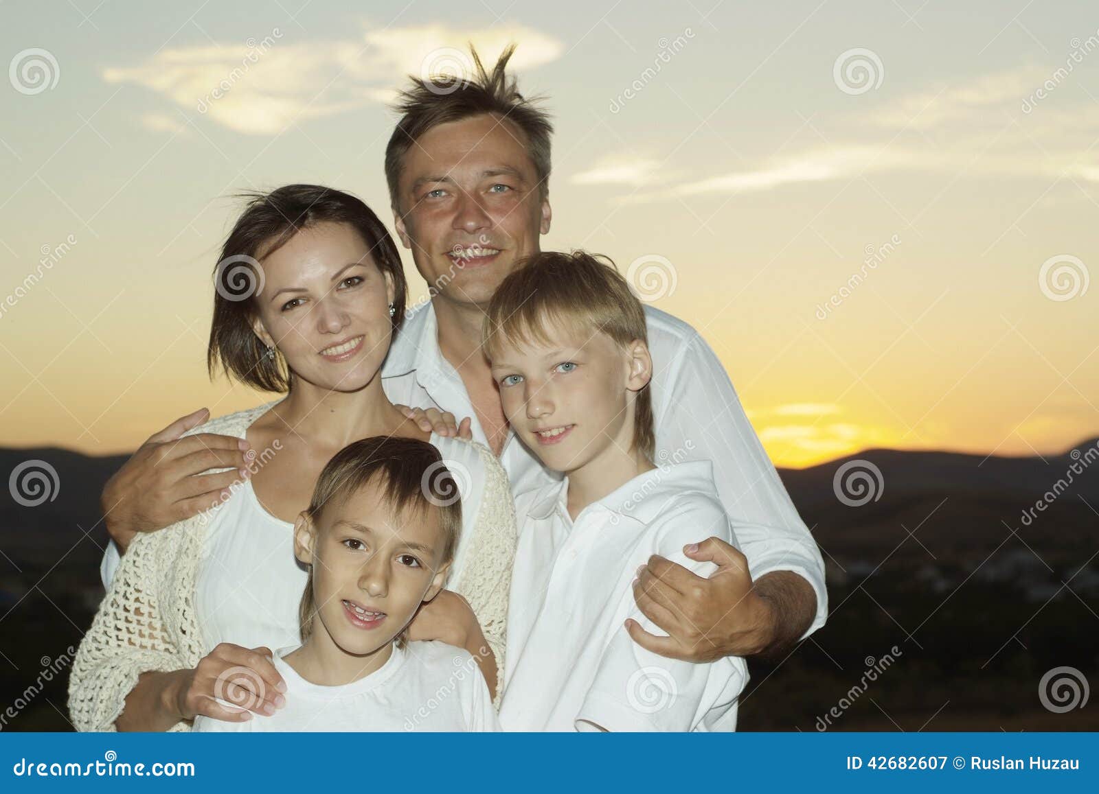 Friendly Family Against the Sunset Stock Image - Image of health ...