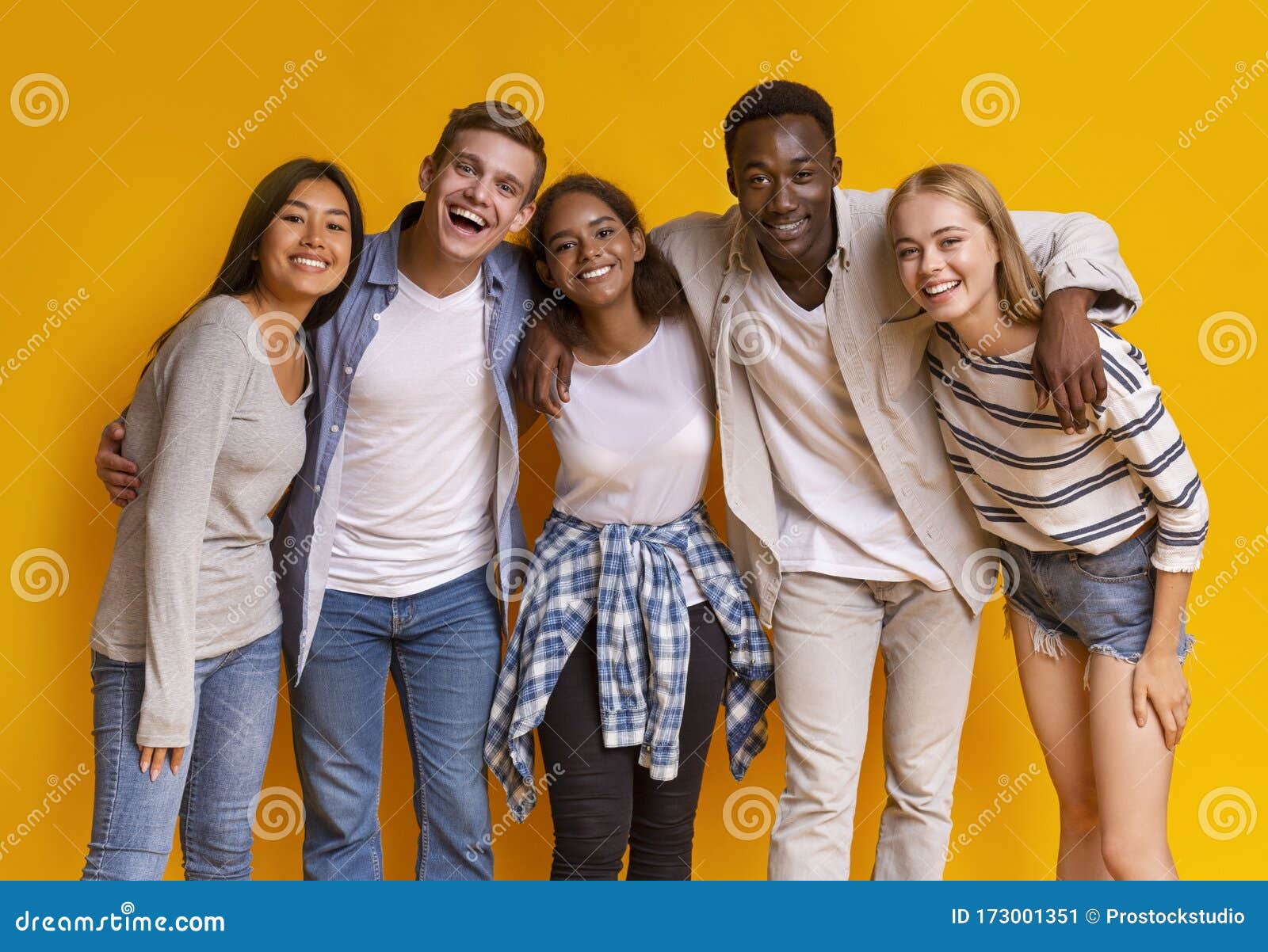 Friendly Group of International Students Smiling Over Yellow Background ... Friendly Group of International Students Smiling Over Yellow Background ...
