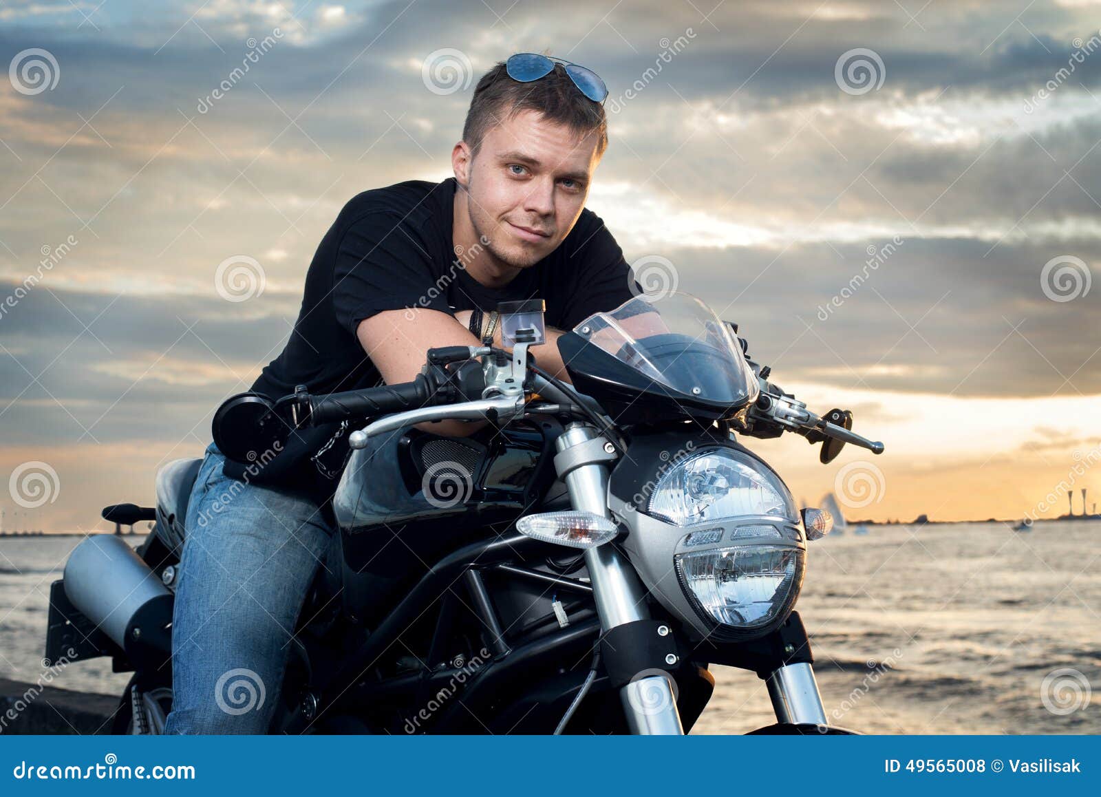 Friendly Guy on a Motorcycle Smiling at the Camera Stock Photo - Image ...
